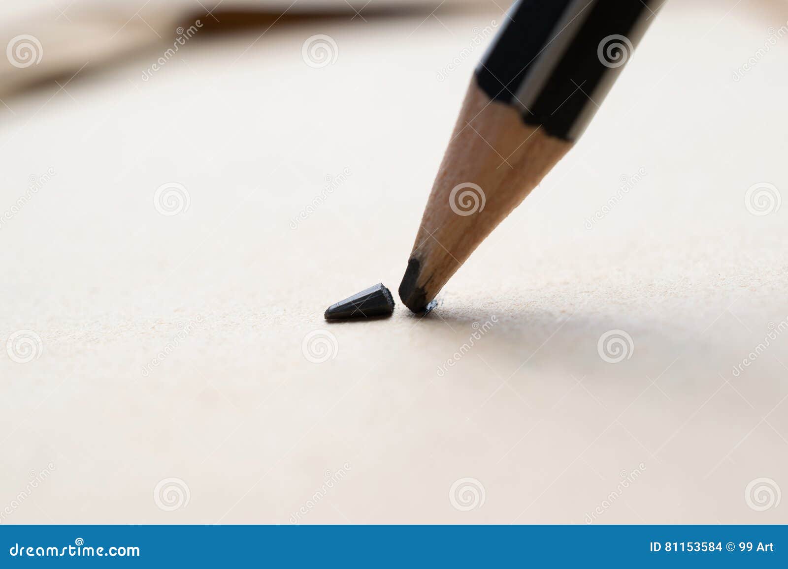 Sharpened Pencil Over a Blank Old Sheet of Paper with a Broken T Stock ...