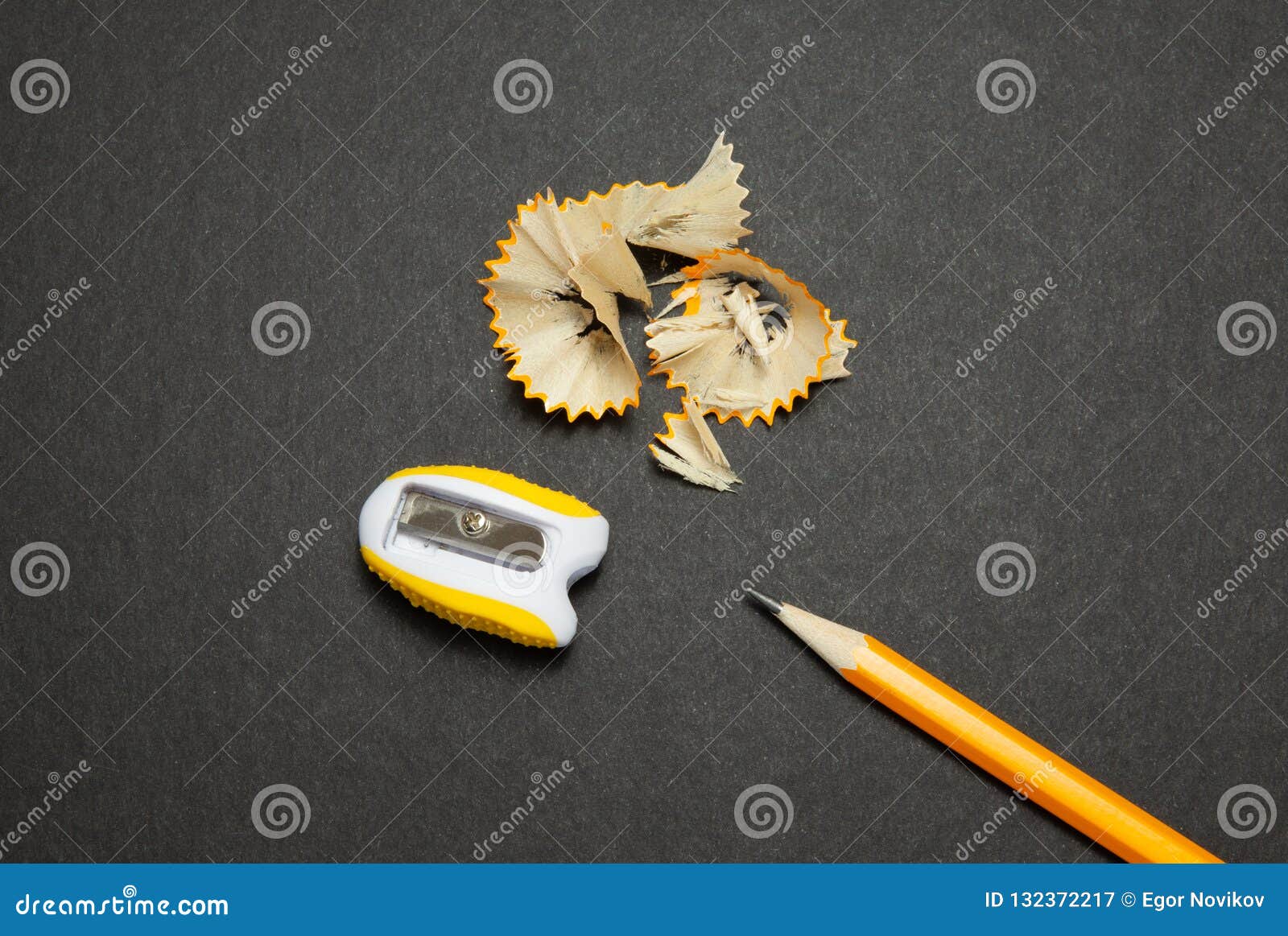 Sharpened Pencil and Sharpener on Black Background, Top View Stock ...