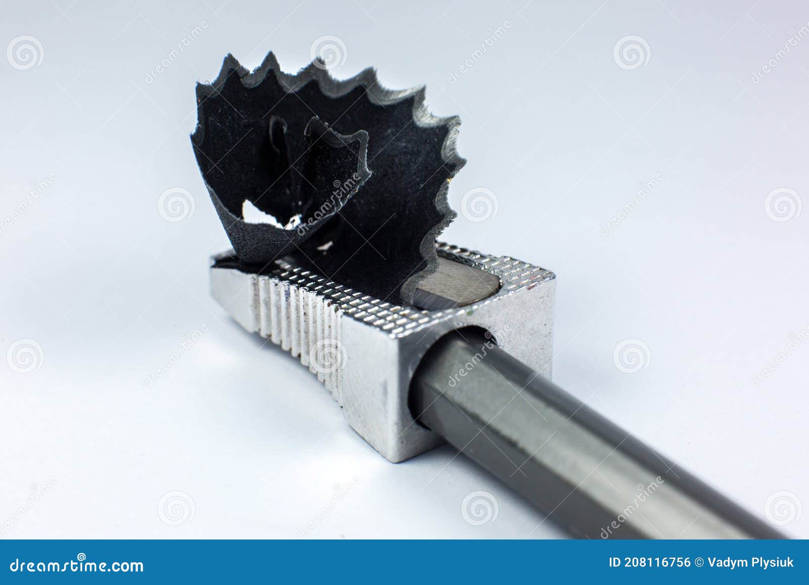 Sharpener and a Broken Pencil. Shavings and a Graphite on White ...