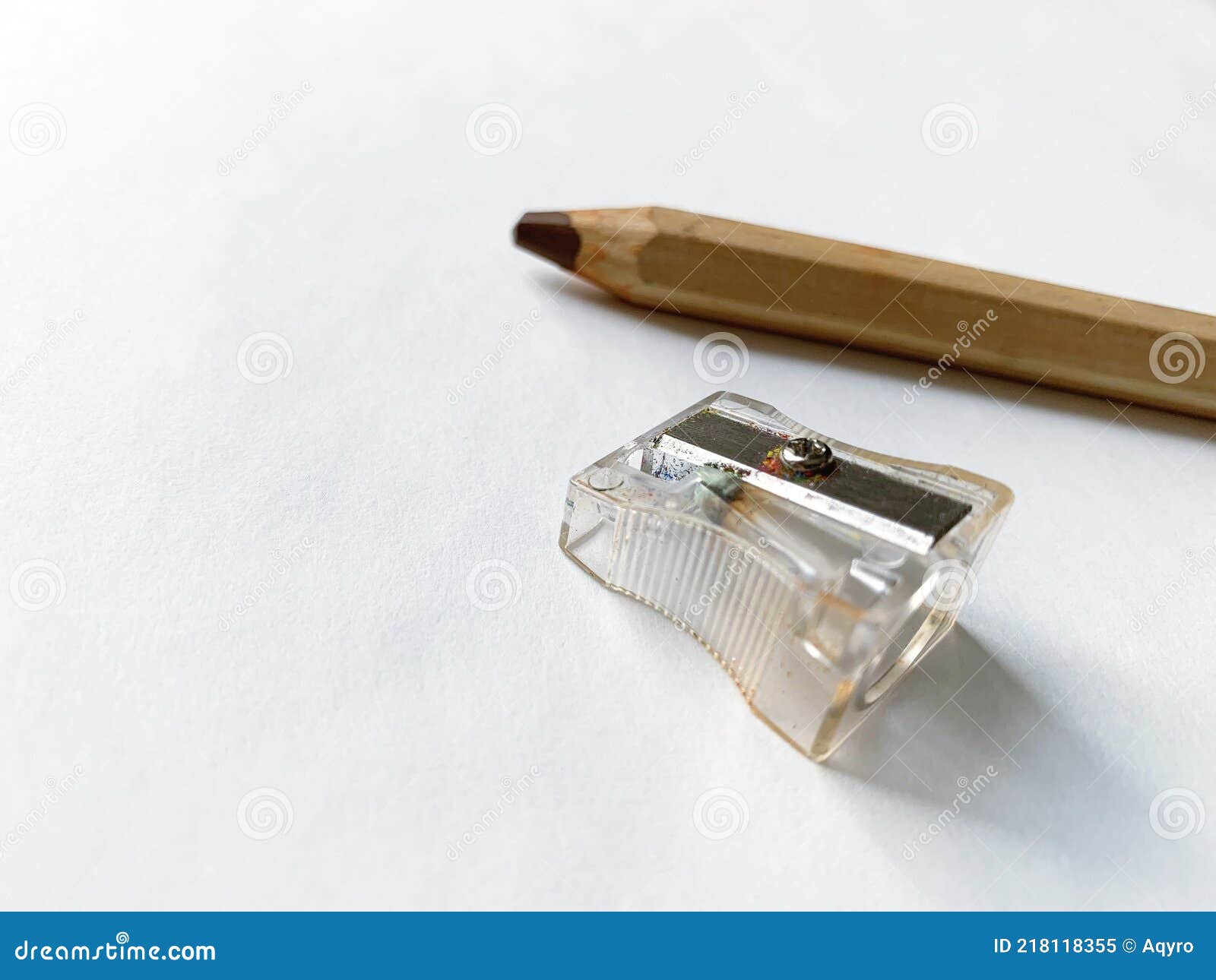 Sharpener and brown pencil stock image. Image of symbol - 218118355
