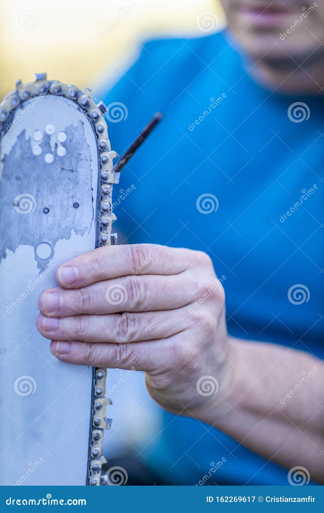 Sharpening a chainsaw stock image. Image of chain, maintenance - 162269617