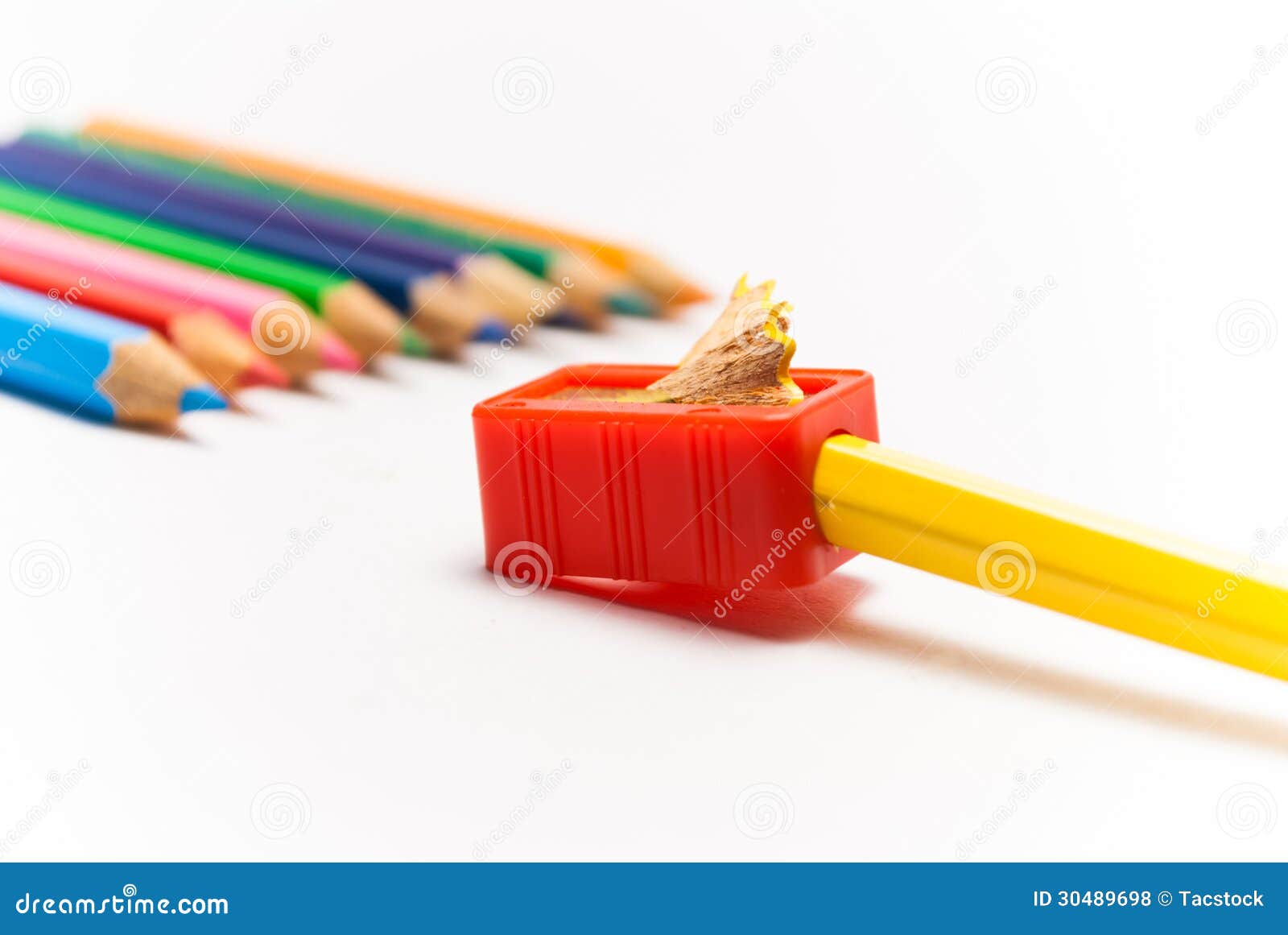 Sharpening a colour pencil stock photo. Image of draw - 30489698