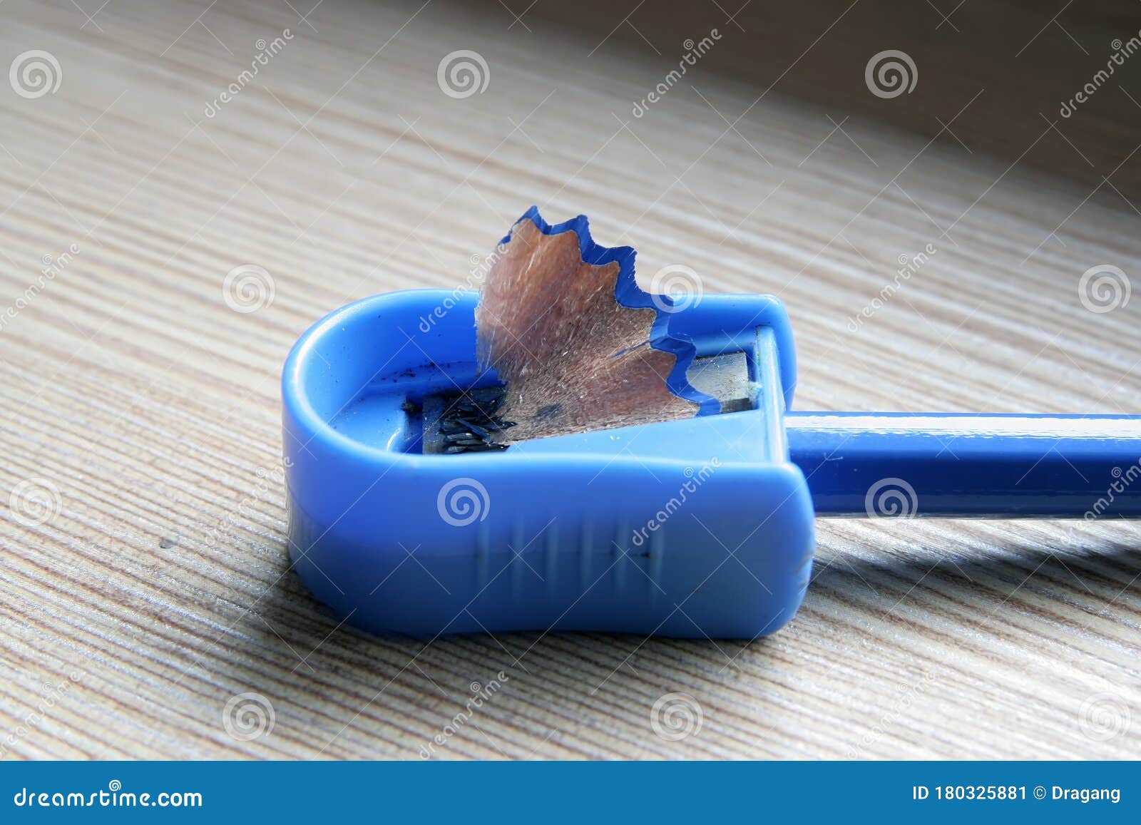 Sharpening Pencil. Wooden Pencil in a Sharpener. Sharpener and a Pencil ...