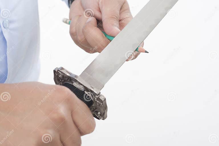 Sharpening Pencils with a Sword Stock Image - Image of objectsequipment ...