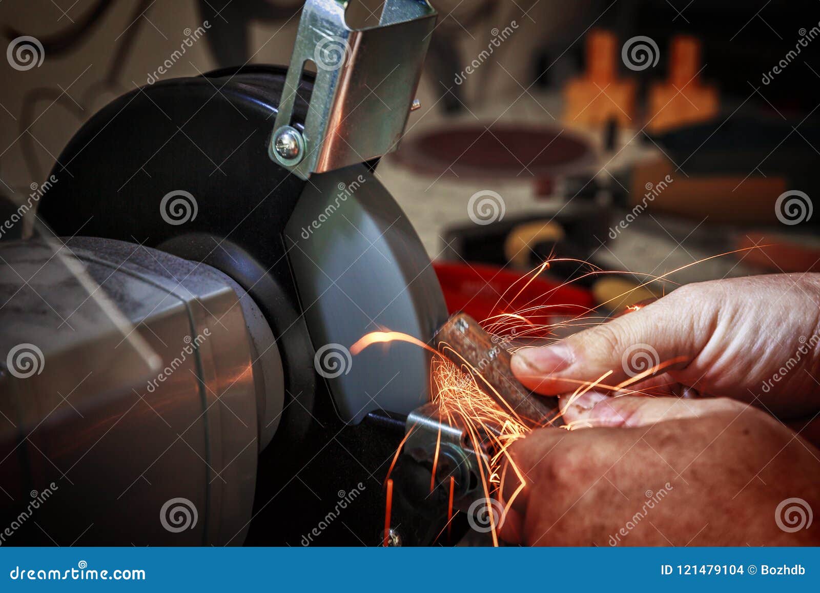 Sharpening the Steel Billet on the Grinding Machine Stock Photo - Image ...