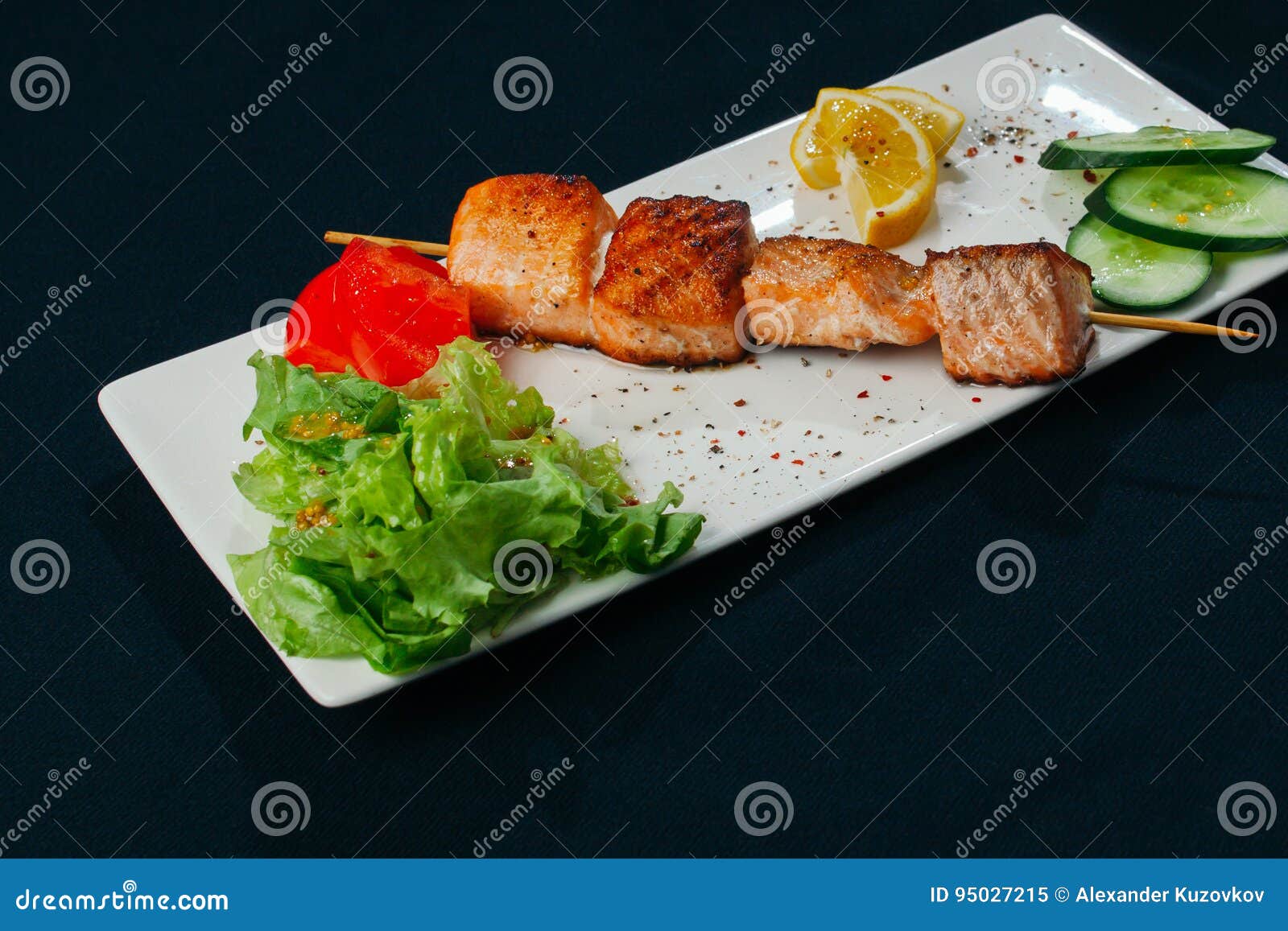 Shashlik of Salmon with Vegetables on White Plate and Black Background ...