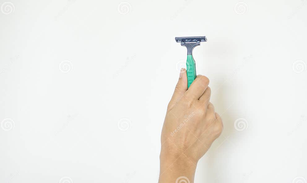Shaver or Razor in Hand on Background. Stock Photo - Image of hold ...