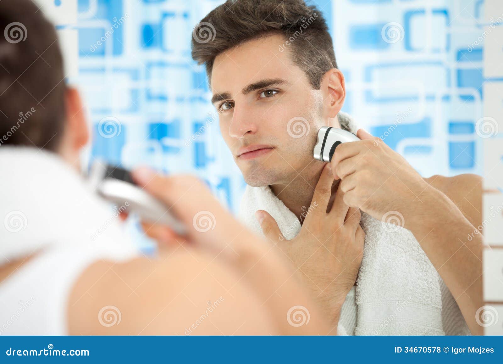 Shaving by electric shaver stock photo. Image of healthy - 34670578