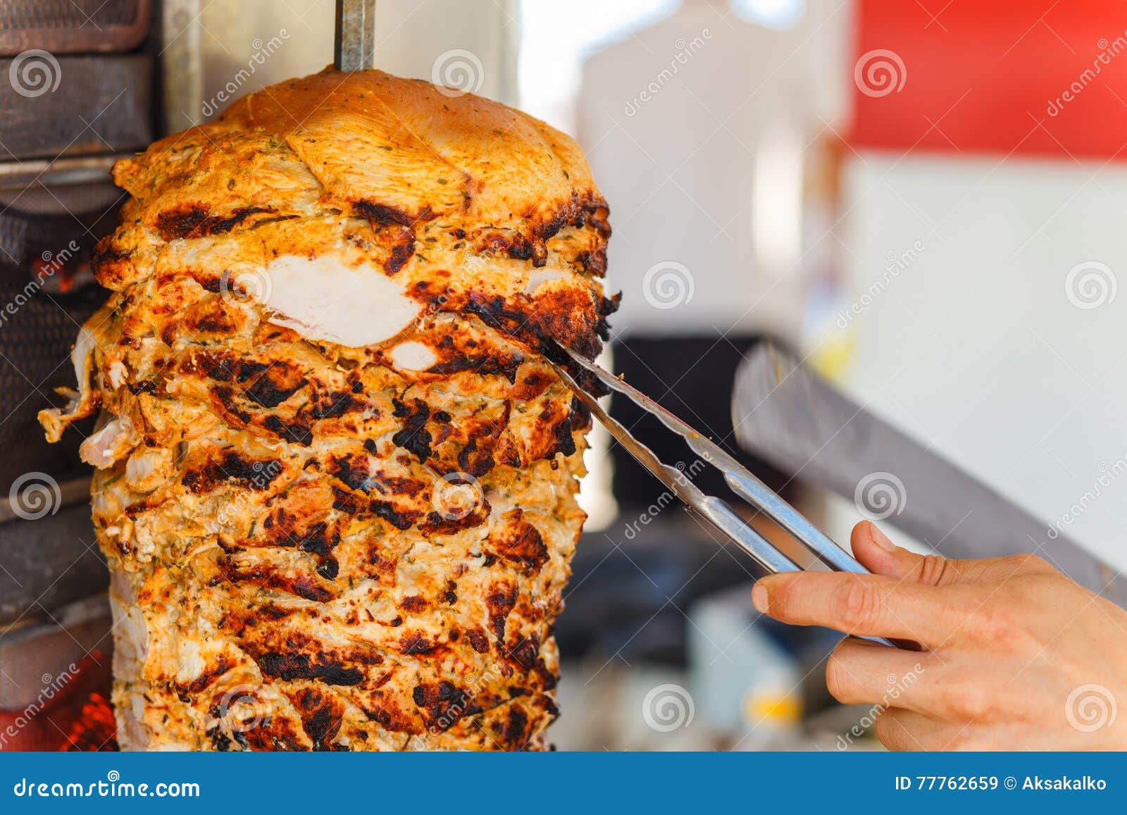 Shawarma meat being cut stock image. Image of cuisine - 77762659
