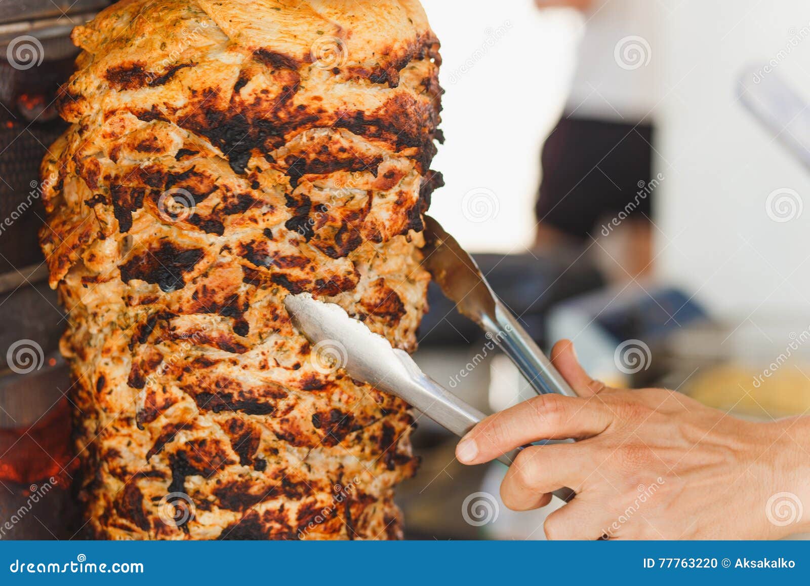 Shawarma meat being cut stock photo. Image of roasted - 77763220