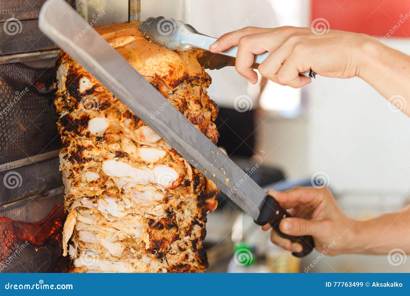 Shawarma meat being cut stock image. Image of oriental - 77763499
