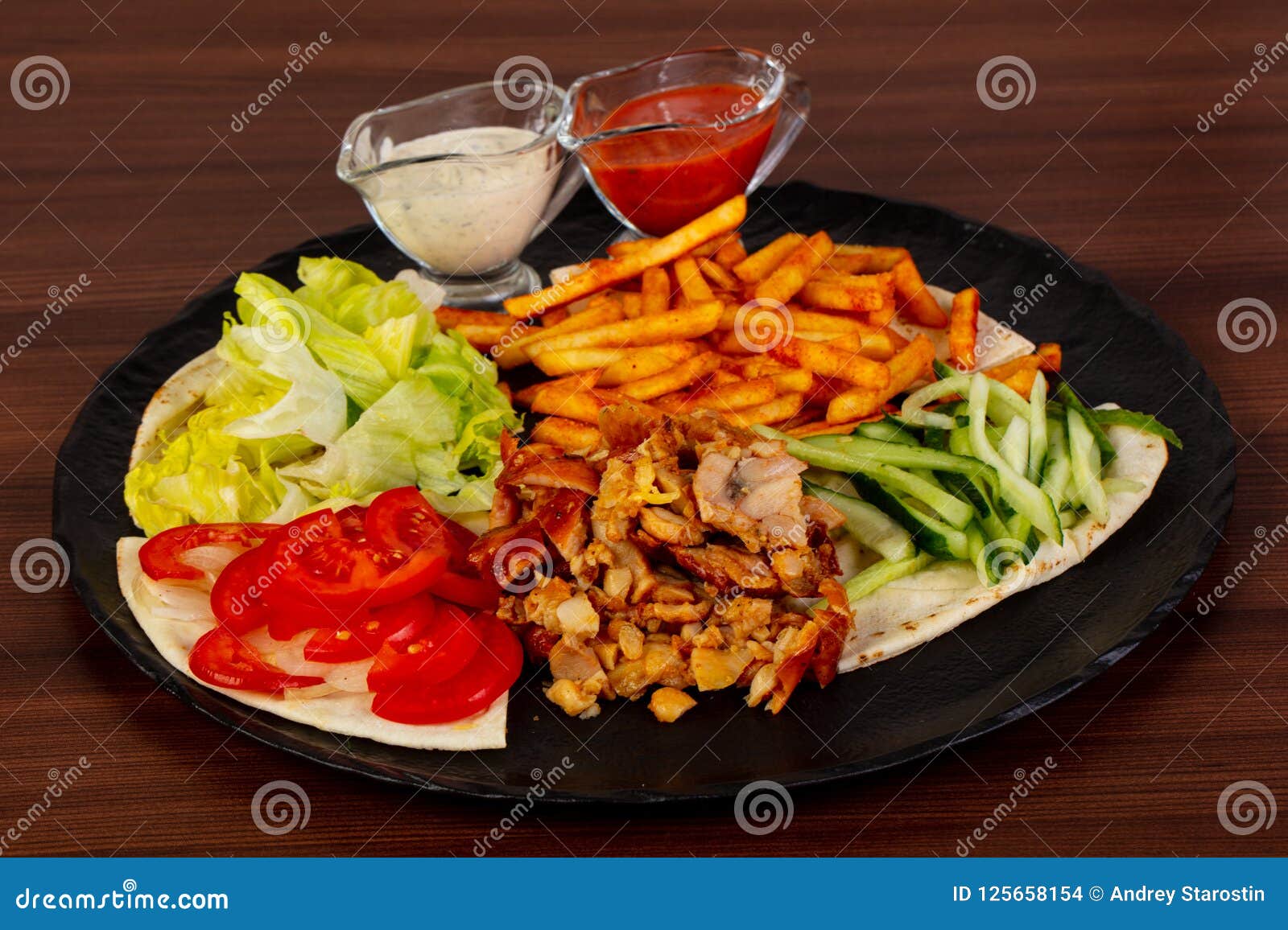 Shawarma in the plate stock photo. Image of middle, fast - 125658154