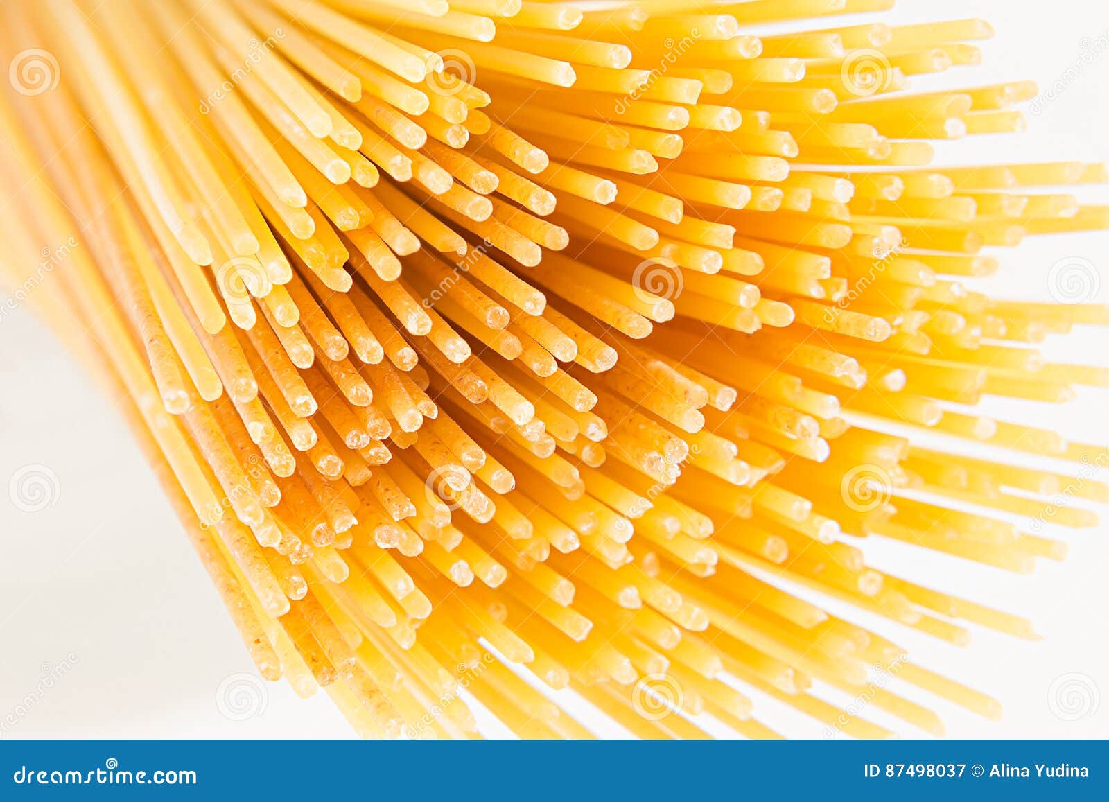 Sheaf Italian Long Yellow Spaghetti Closeup on White Background. Stock ...