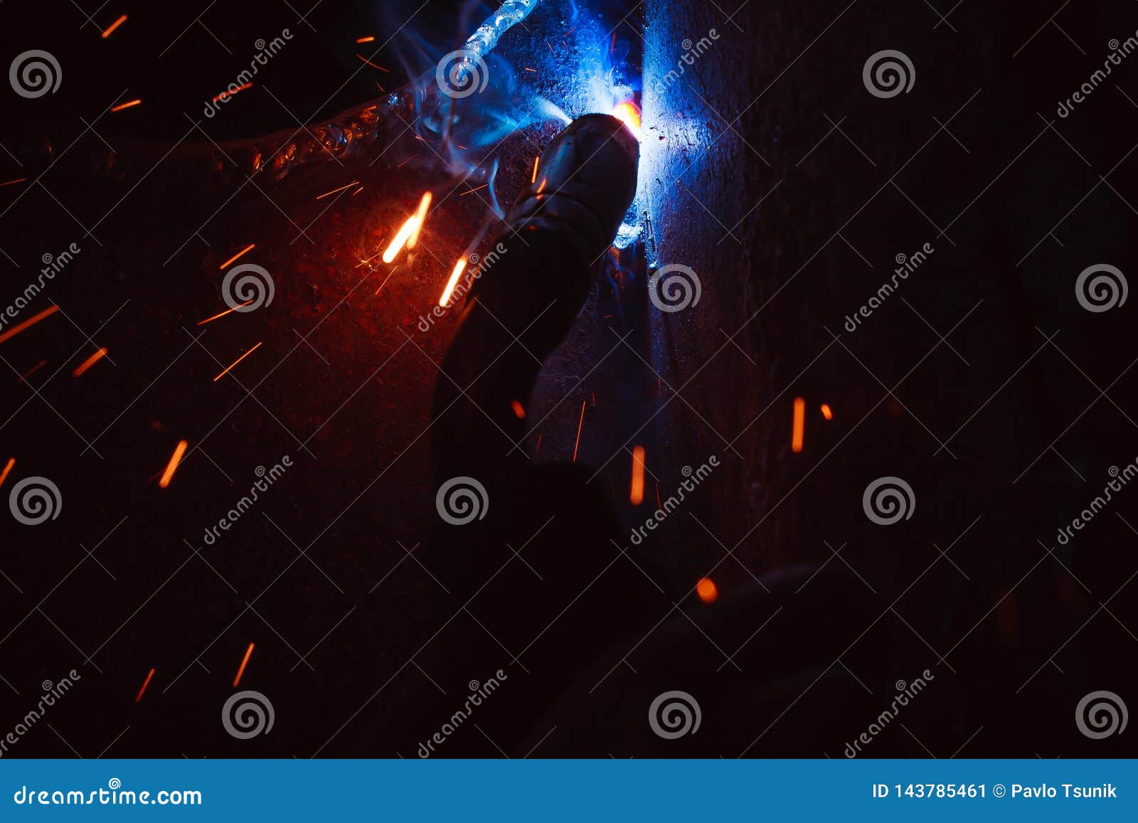A Sheaf Of Sparks Caused By A Welding Arc. Semi-automatic Welding Work ...