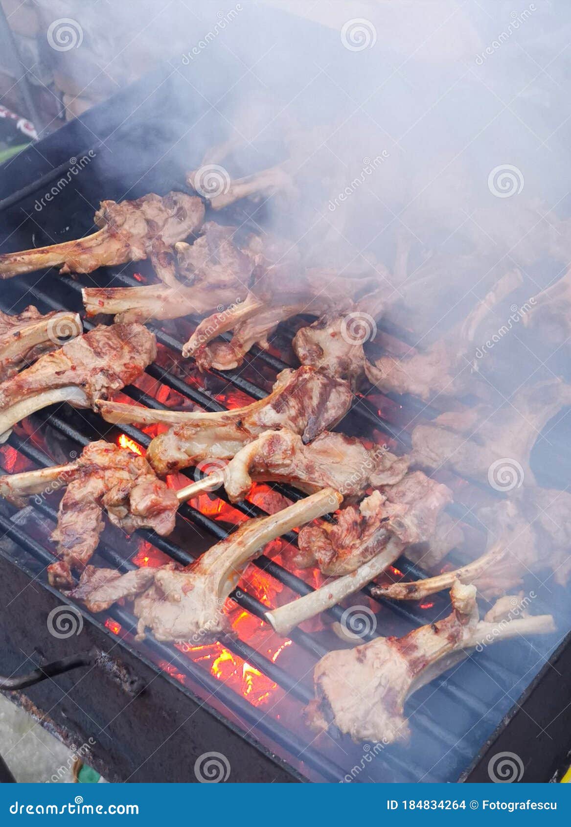 Sheep ribs on a hot grill stock photo. Image of barbecue - 184834264