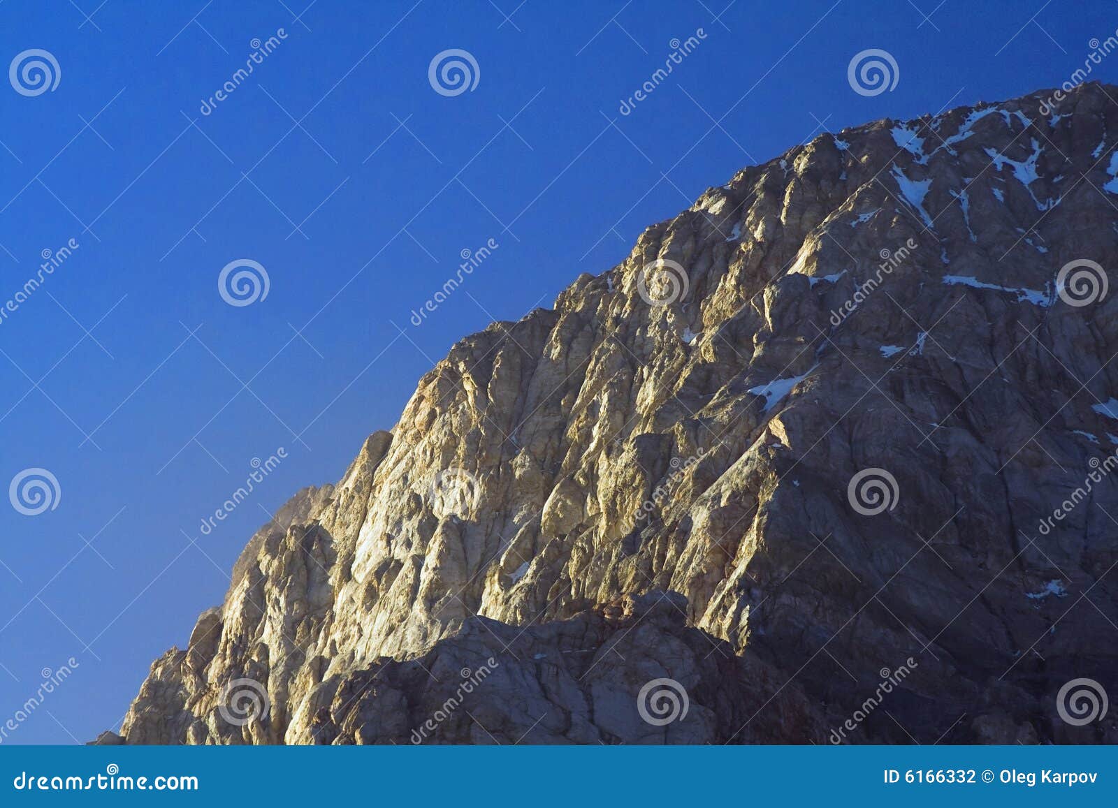 Sheer Cliff Illuminated by the Sun Stock Photo - Image of height ...