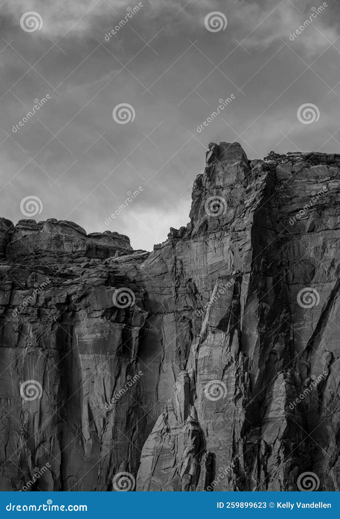 Sheer Cliffs Below Cloud Wisps Black and White Stock Image - Image of ...
