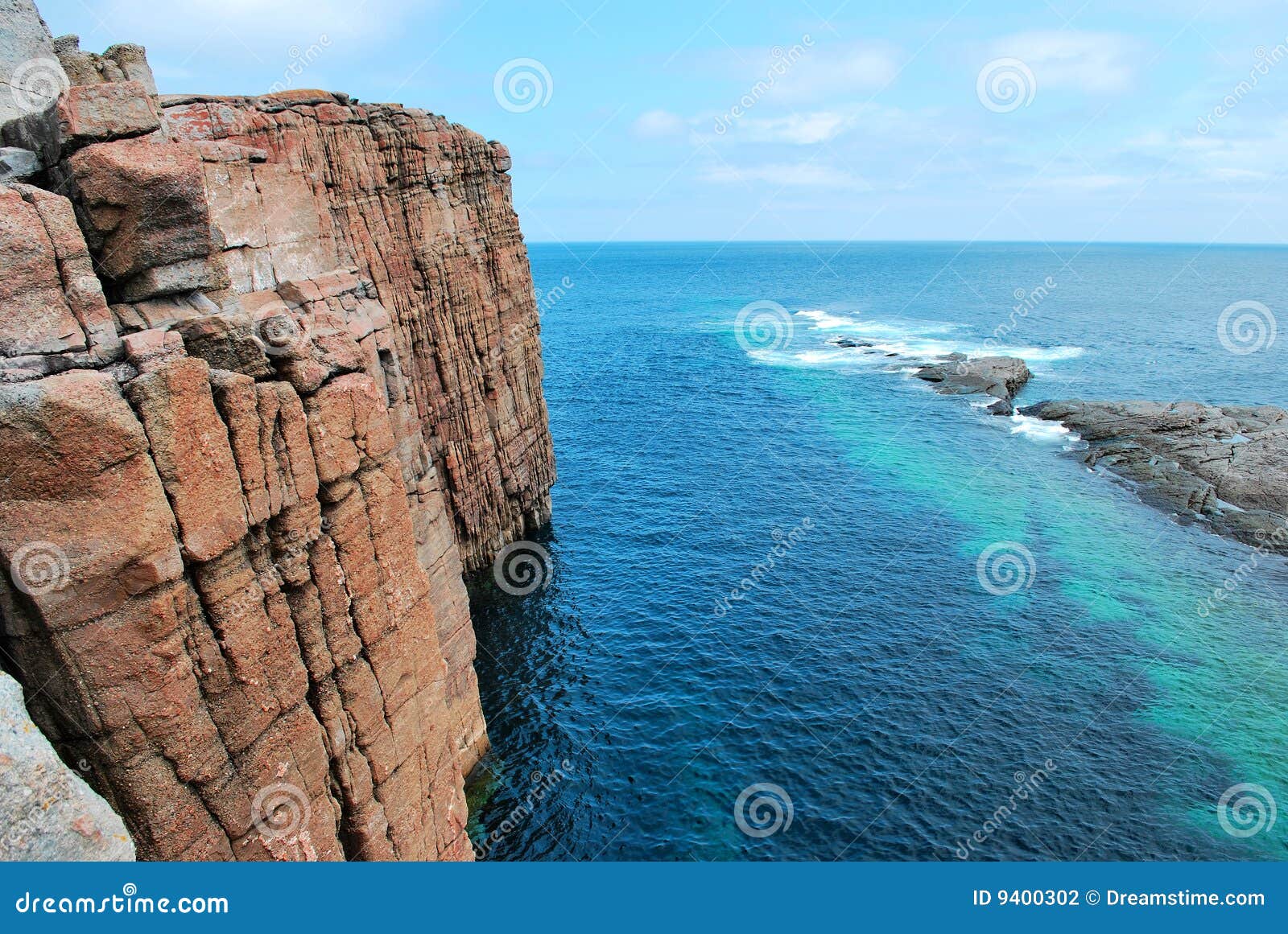 Sheer Coastal Rock Formation Stock Photo - Image of outdoors, rocks ...
