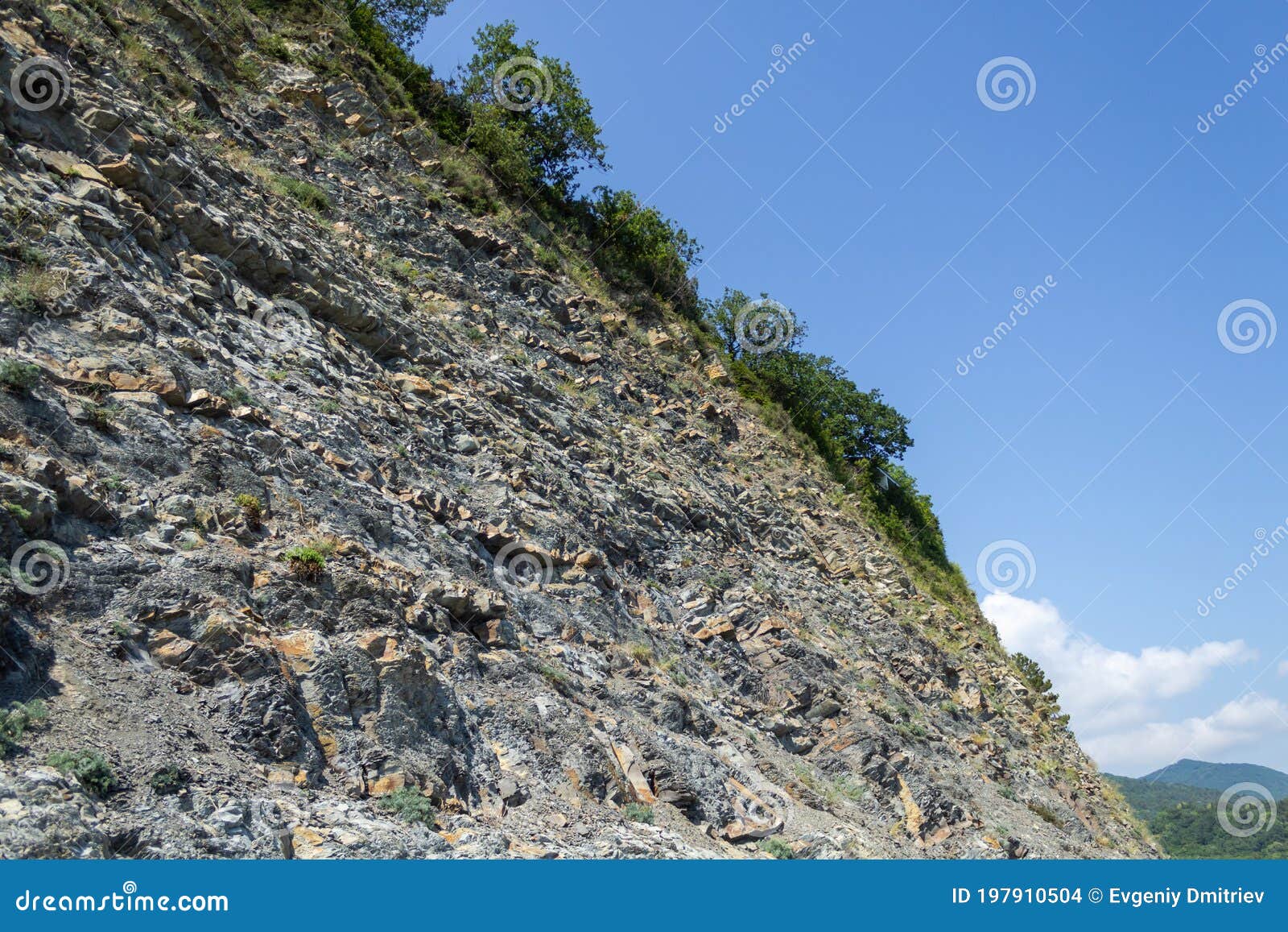 Sheer rock with trees stock photo. Image of mediteran - 197910504