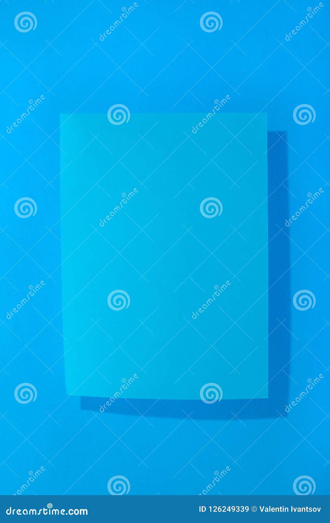 Sheet of Blue Paper on a Blue Background Stock Image - Image of line ...