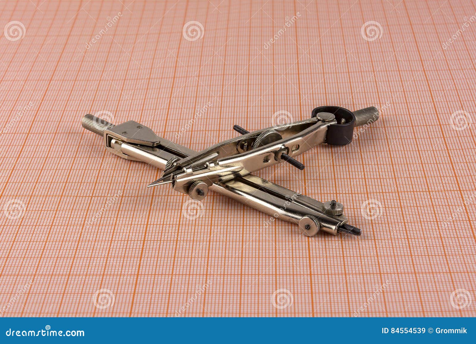 On a Sheet of Graph Paper on Two Compasses Stock Image - Image of ...