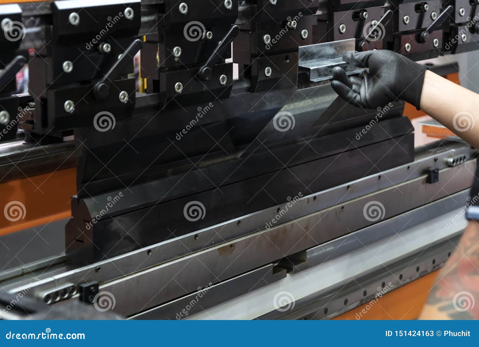 The Sheet Metal Bending Machine with Hand of Operator. Stock Image ...