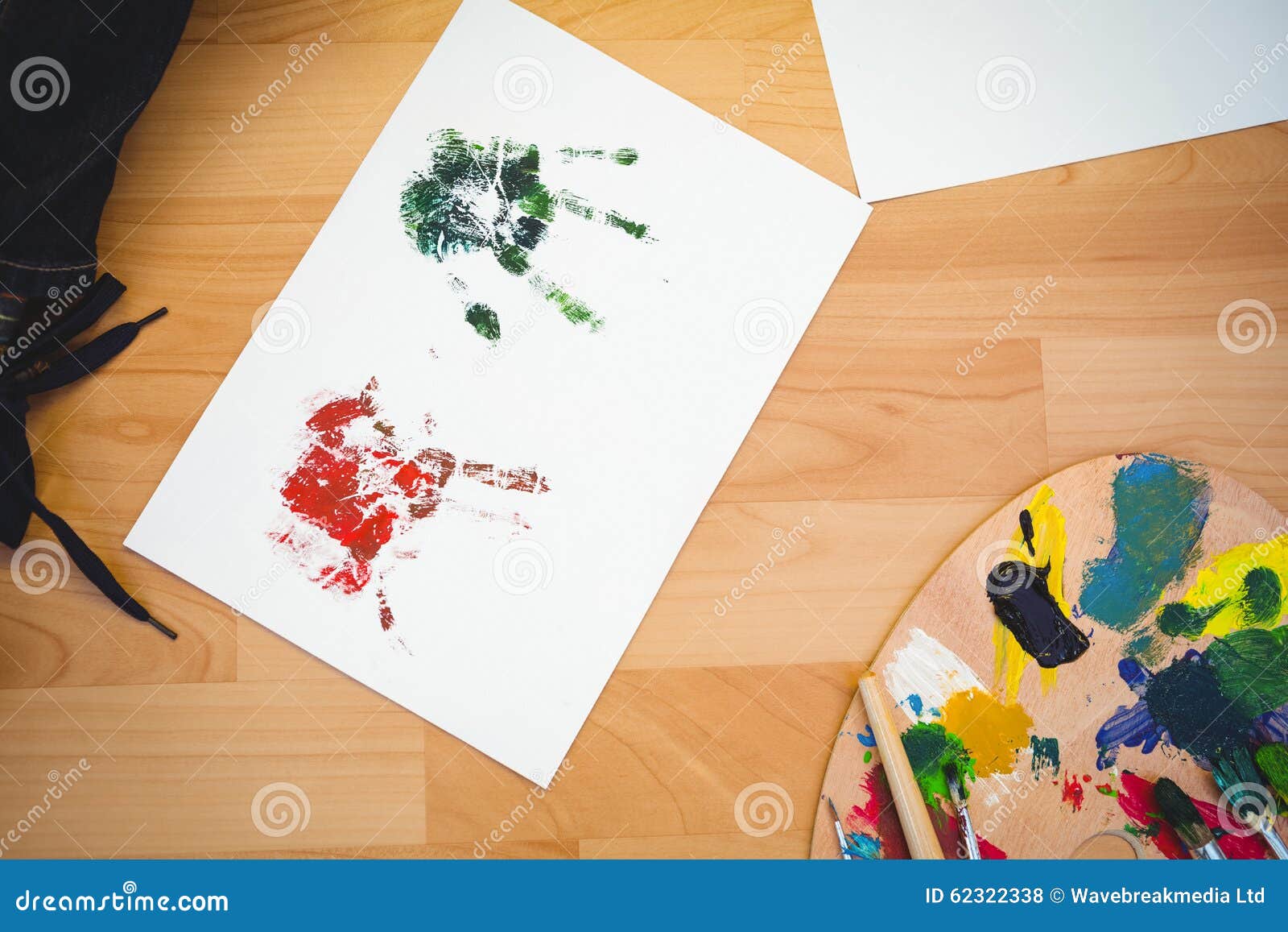 Sheet of Paper with Hand Prints on it Stock Photo - Image of floor ...