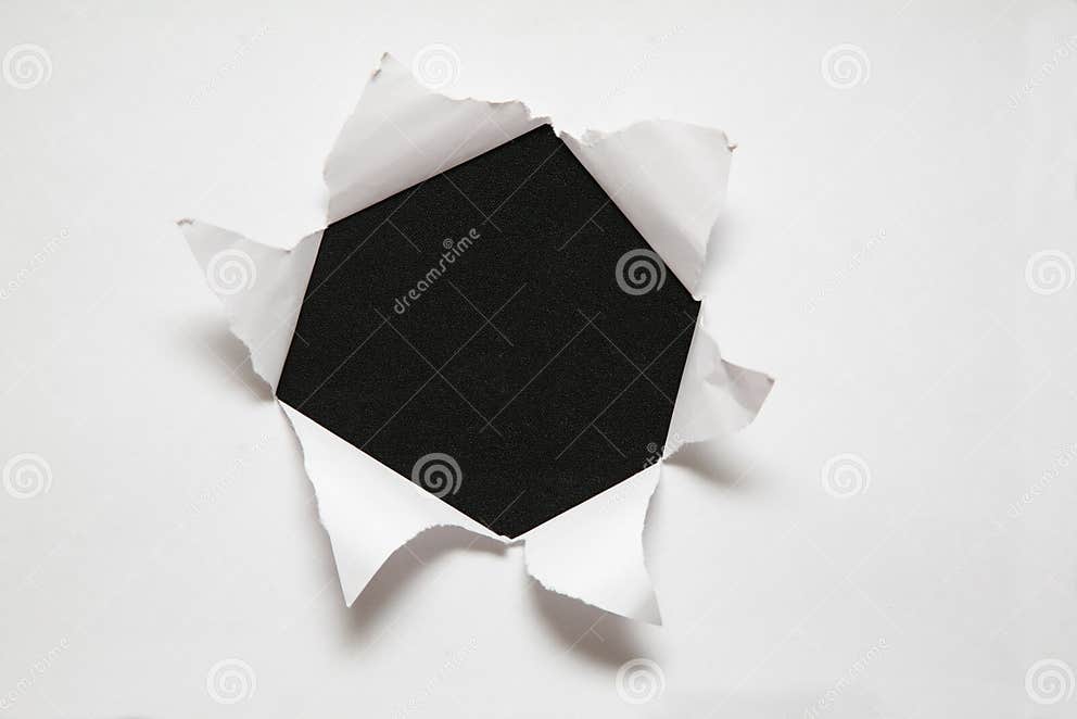 The Sheet of Paper with the Hole Stock Image - Image of break, isolated ...