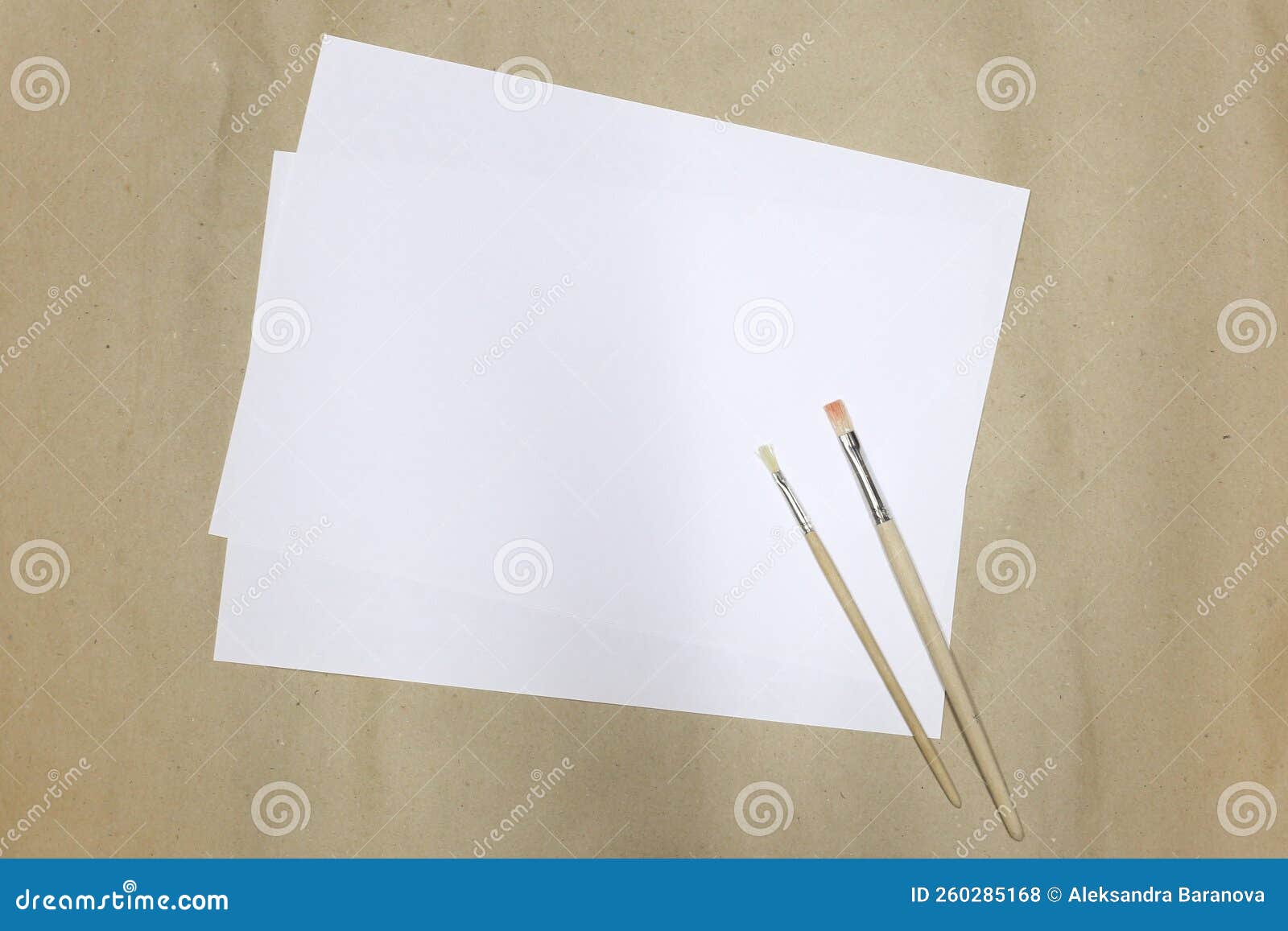 Sheet of White Paper and Artistic Brushes on a Crafting Background ...