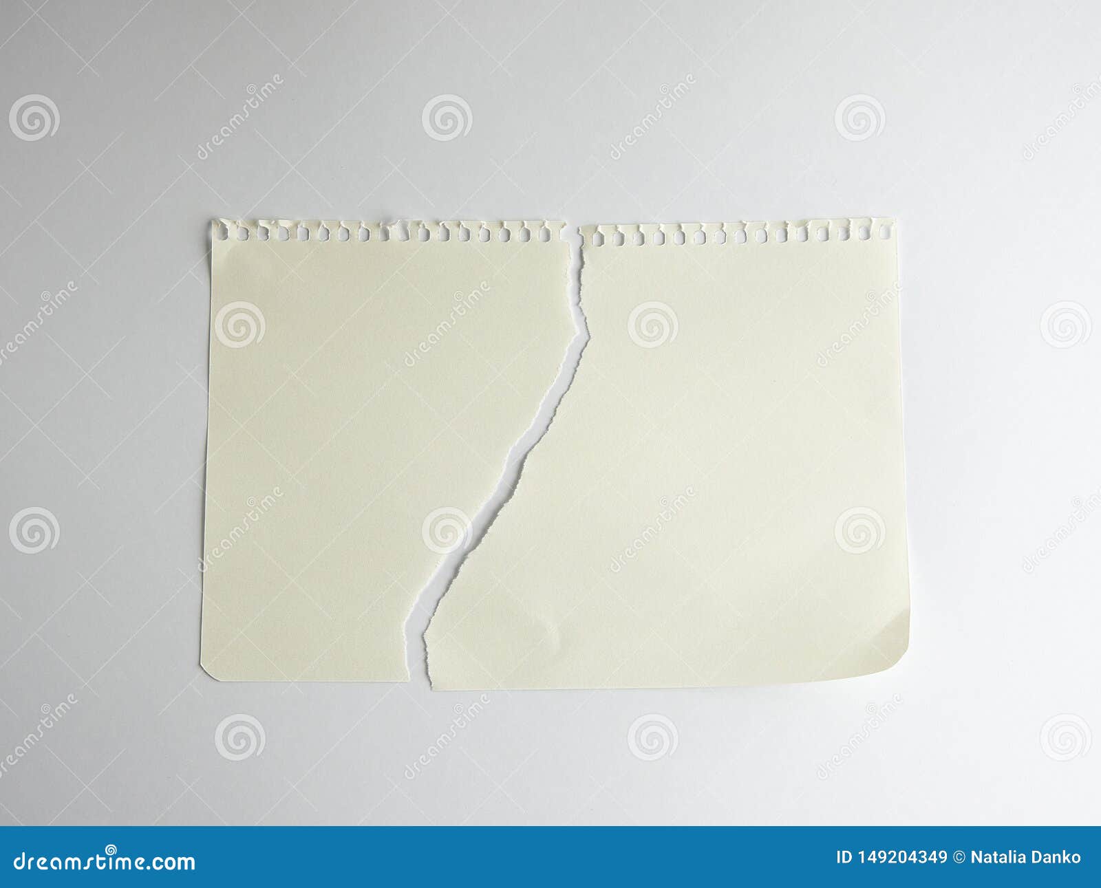 Sheet of White Paper Torn in Half with a Spiral Notepad Stock Image ...