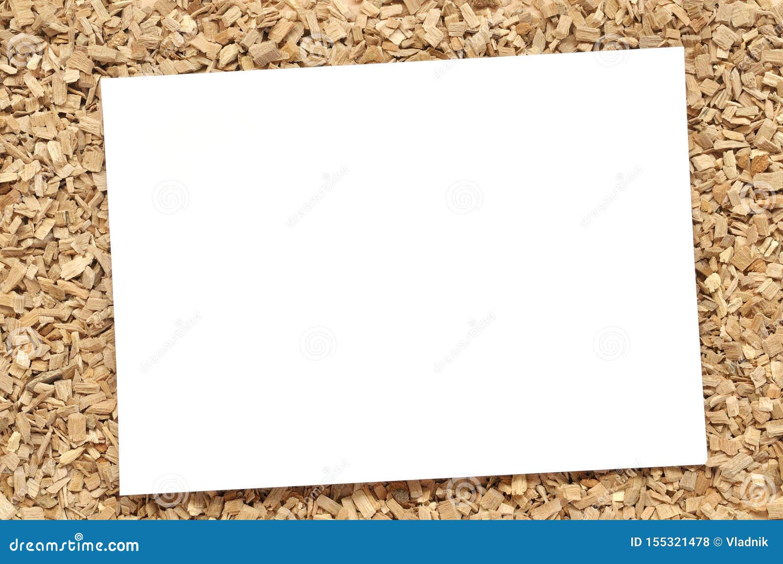 A Sheet of White Paper on Wood Chips Stock Photo - Image of background ...