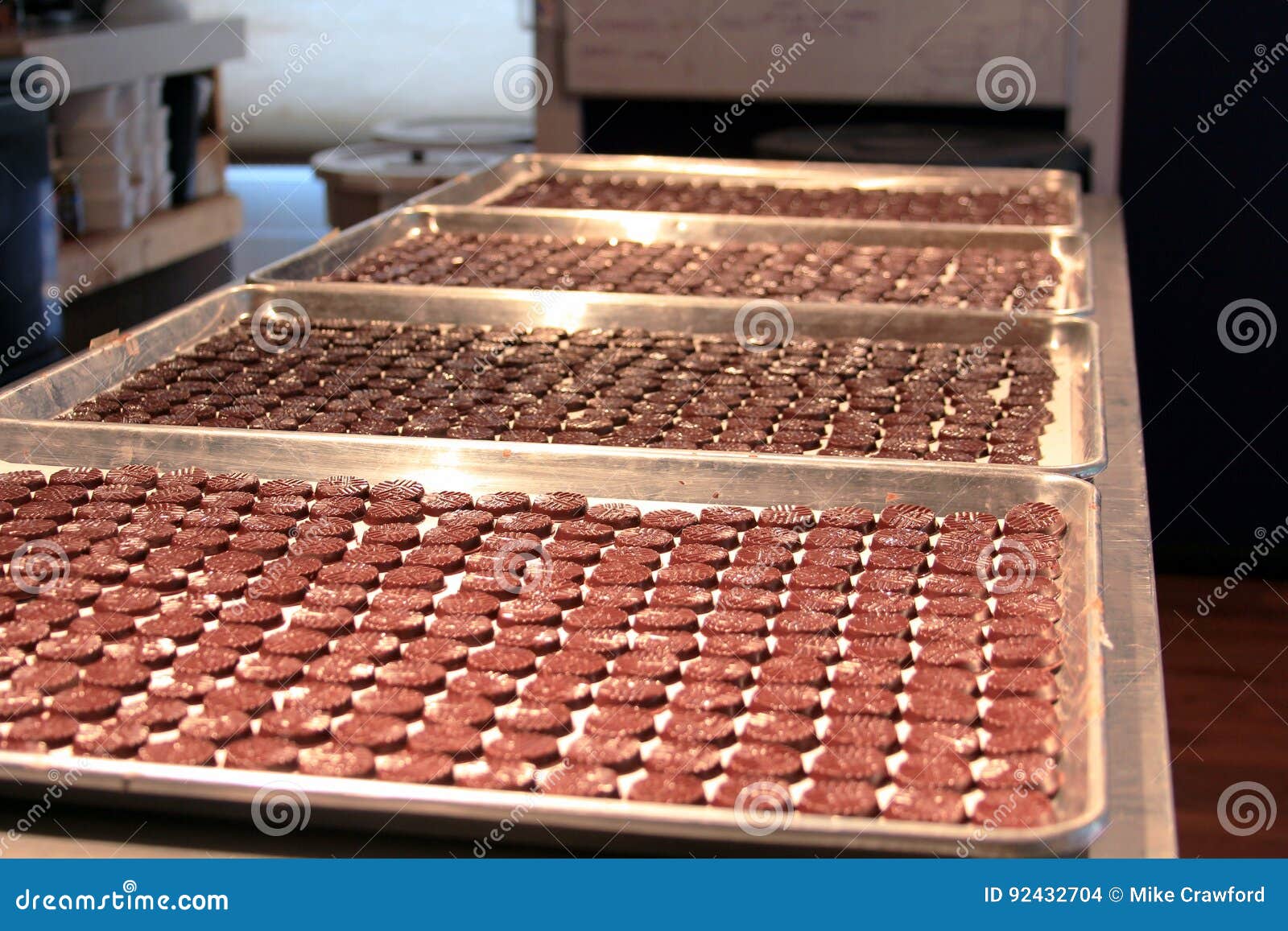 Sheets of chocolate discs stock photo. Image of food - 92432704