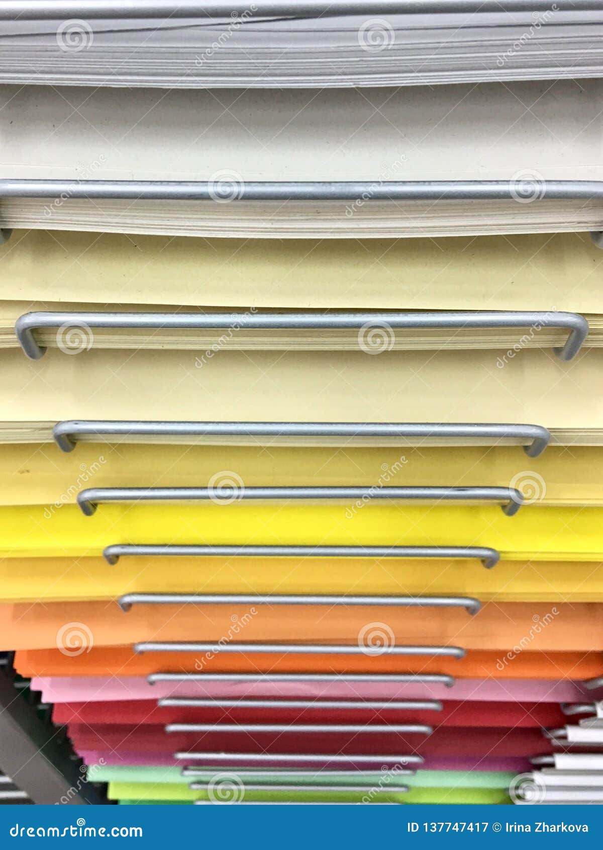 Sheets of Colored Paper Folded in a Row Stock Image - Image of yellow ...