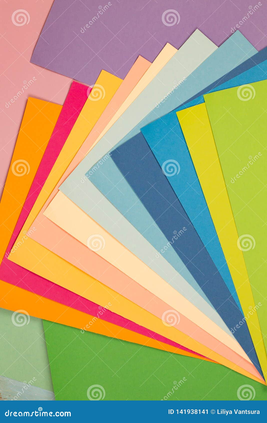 Sheets of Colored Paper. Many Colored Sheets of Paper are Laid Out in ...