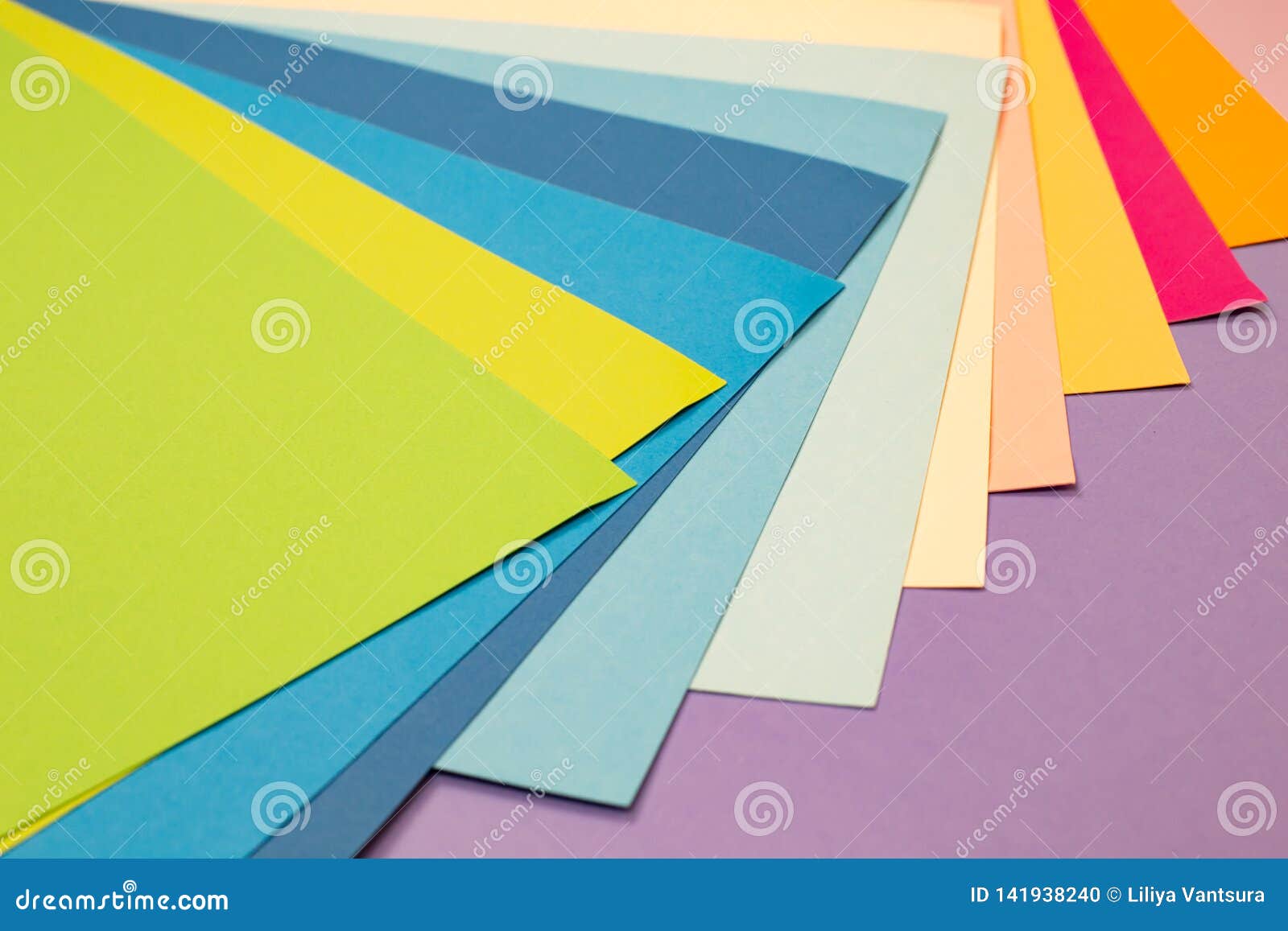 Sheets of Colored Paper. Many Colored Sheets of Paper are Laid Out in ...