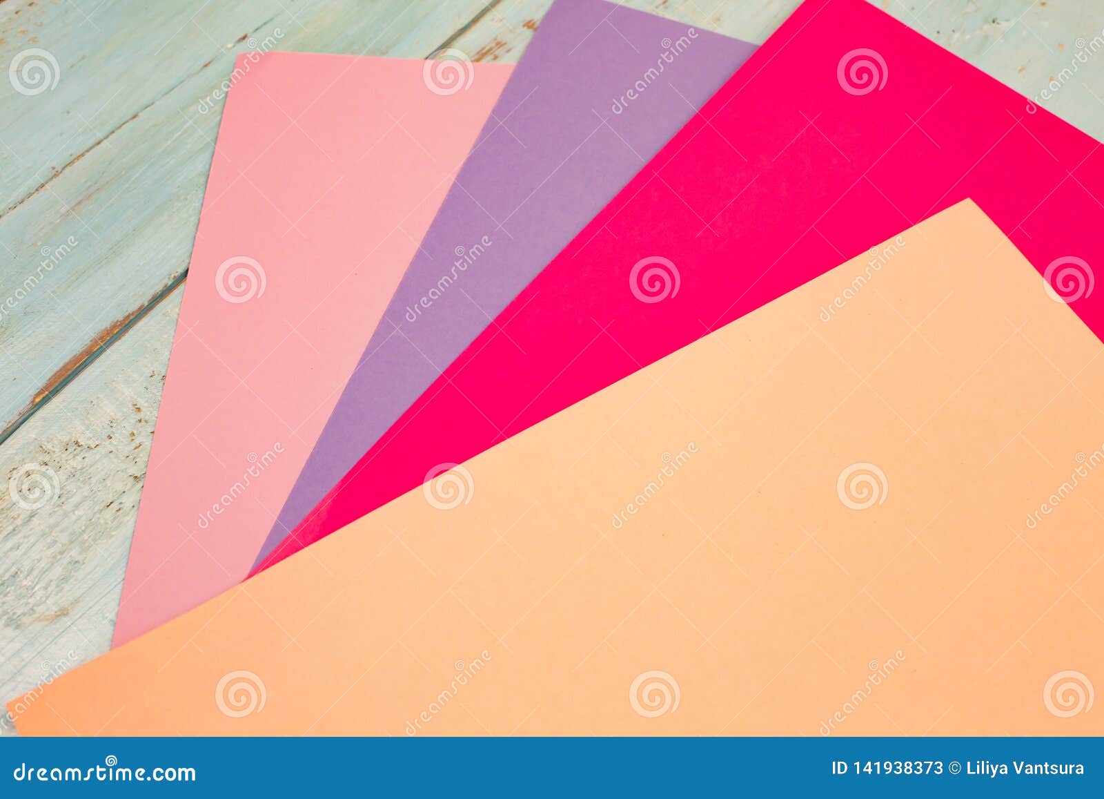 Sheets of Colored Paper. Many Colored Sheets of Paper are Laid Out in ...