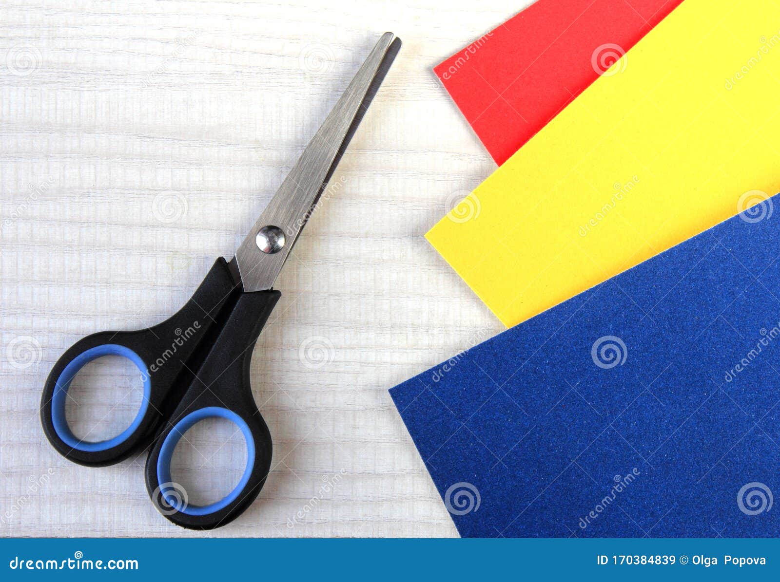 Top View of Sheets of Colored Paper and Scissors on Light Wooden ...