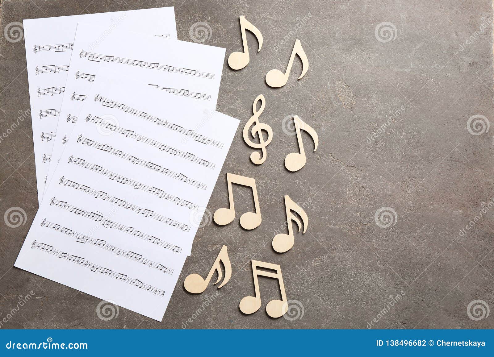 Sheets and Music Notes on Color Background, Top View Stock Photo ...