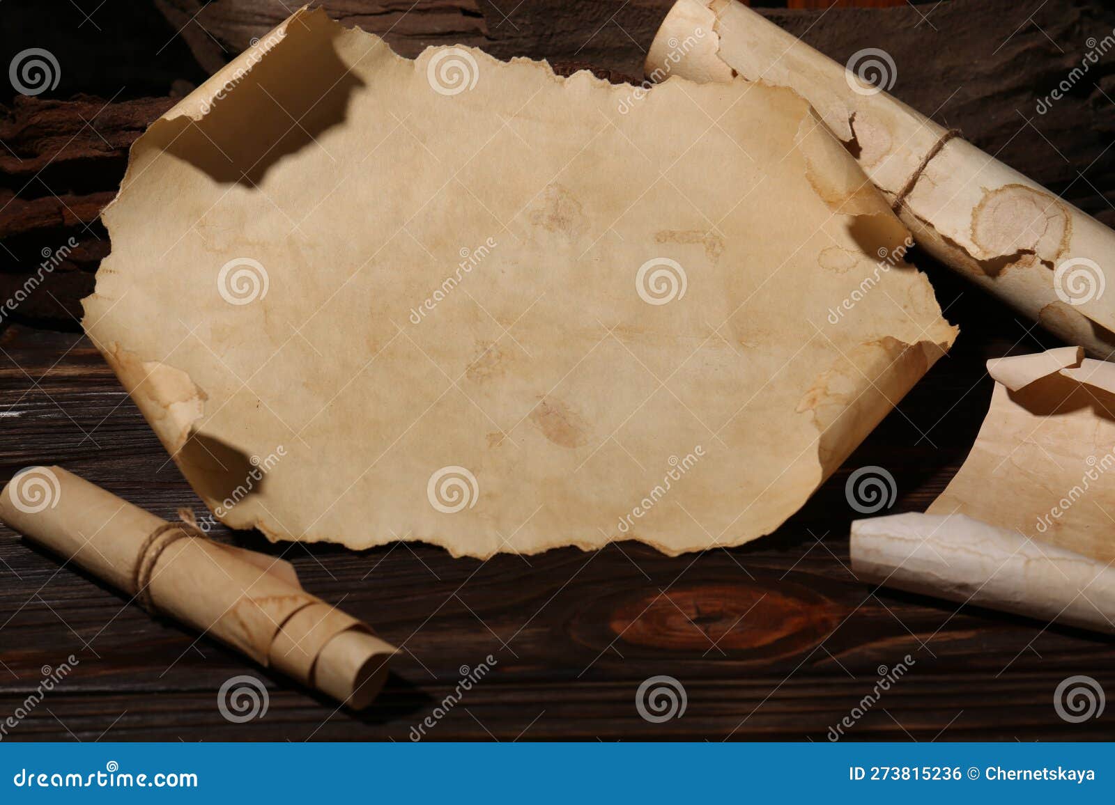 Sheets of Old Parchment Paper on Wooden Table Stock Photo - Image of ...
