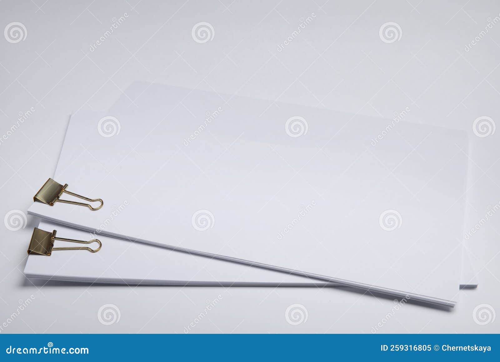 Sheets of Paper with Clips on White Background Stock Image - Image of ...