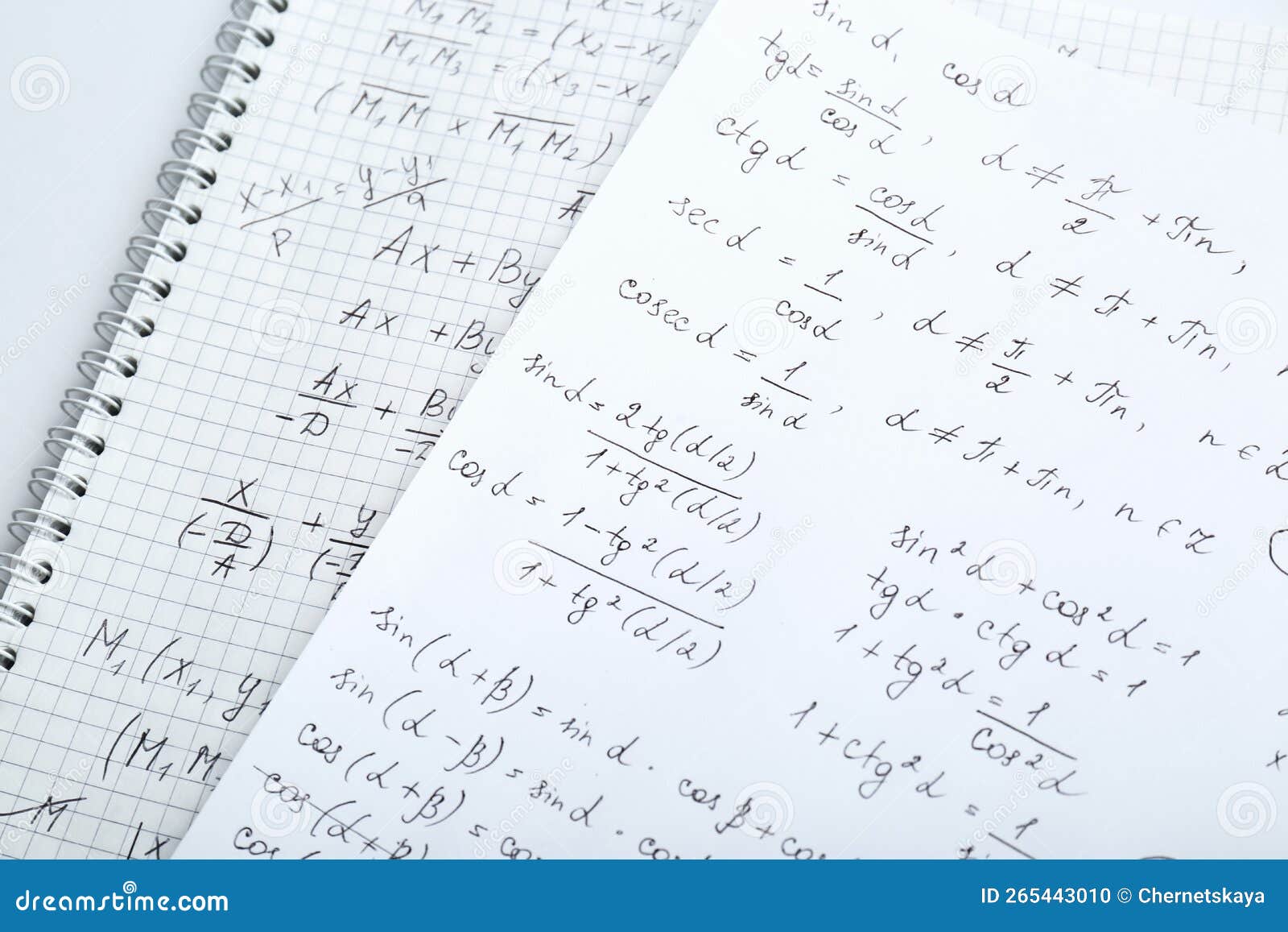 Sheets of Paper with Different Mathematical Formulas on Table, Closeup ...