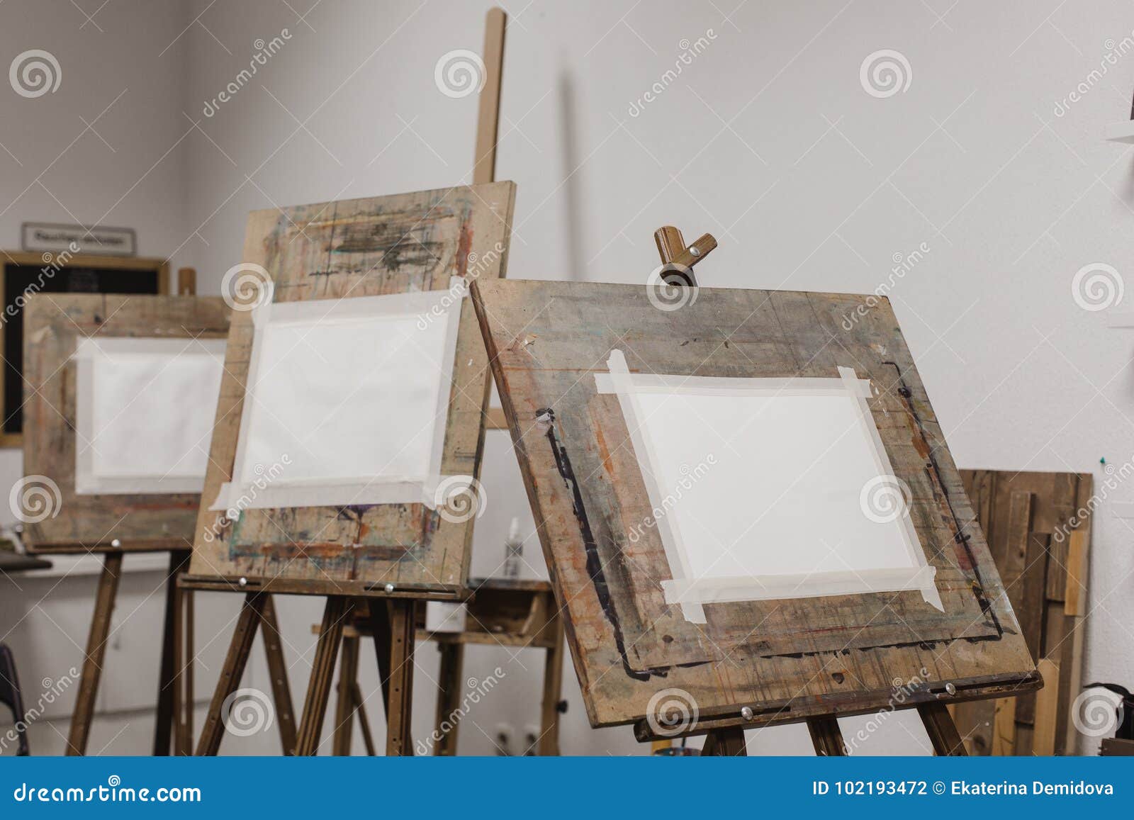 Sheets of paper on easels stock photo. Image of sketch - 102193472