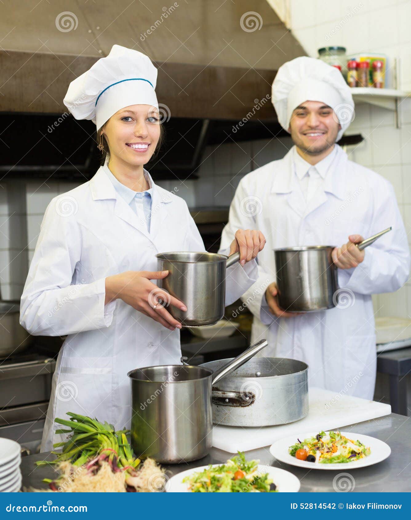 Shef and Assistant Preparing Meal Stock Photo - Image of adult, clothes ...