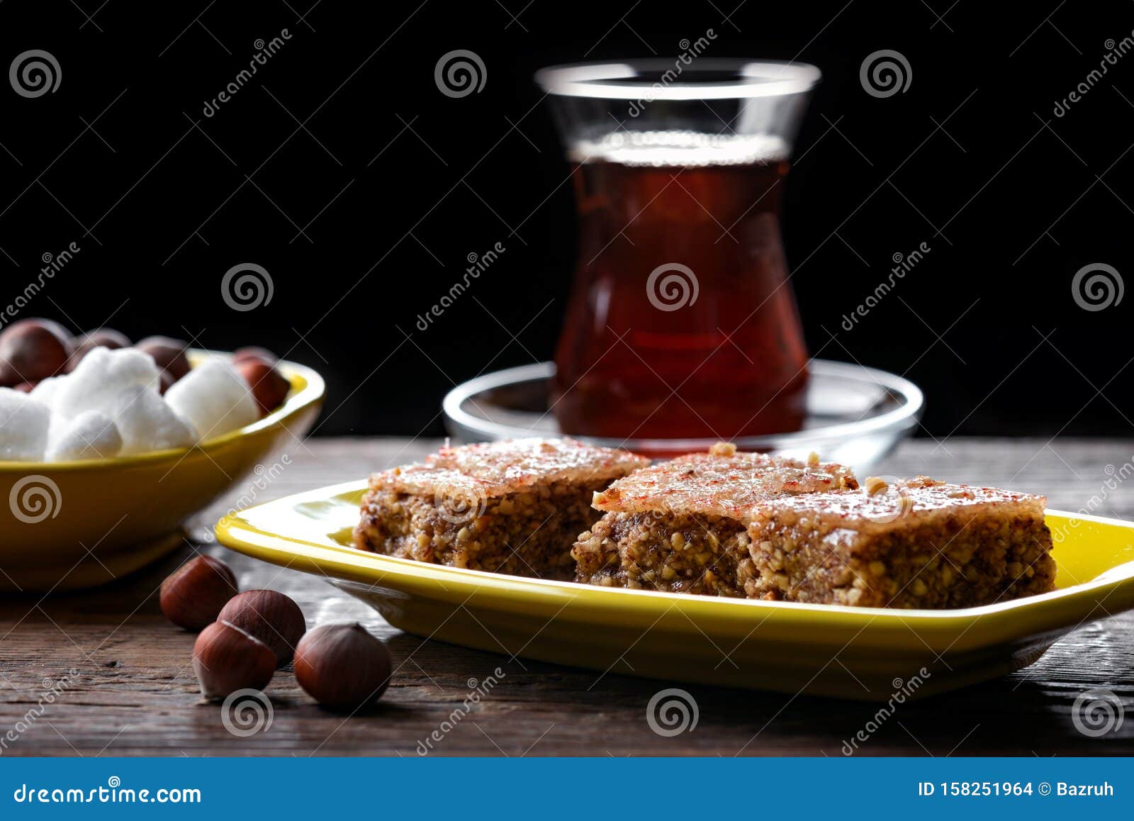 Sheki halva with black tea stock photo. Image of food - 158251964