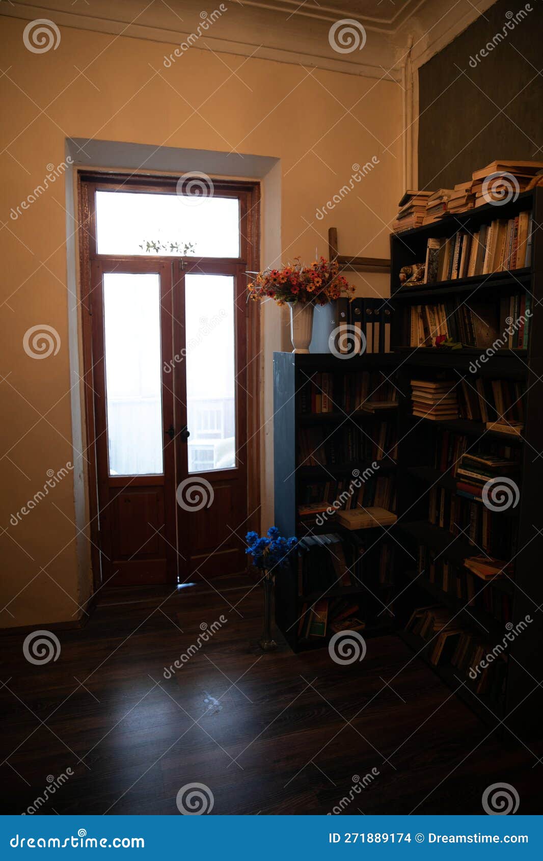 A Shelf with Books in a Dark Room in the Library Stock Photo - Image of ...