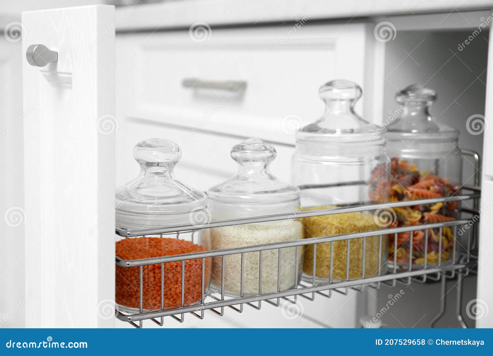 Shelf with Different Jars Indoors. Order in Kitchen Stock Photo - Image ...
