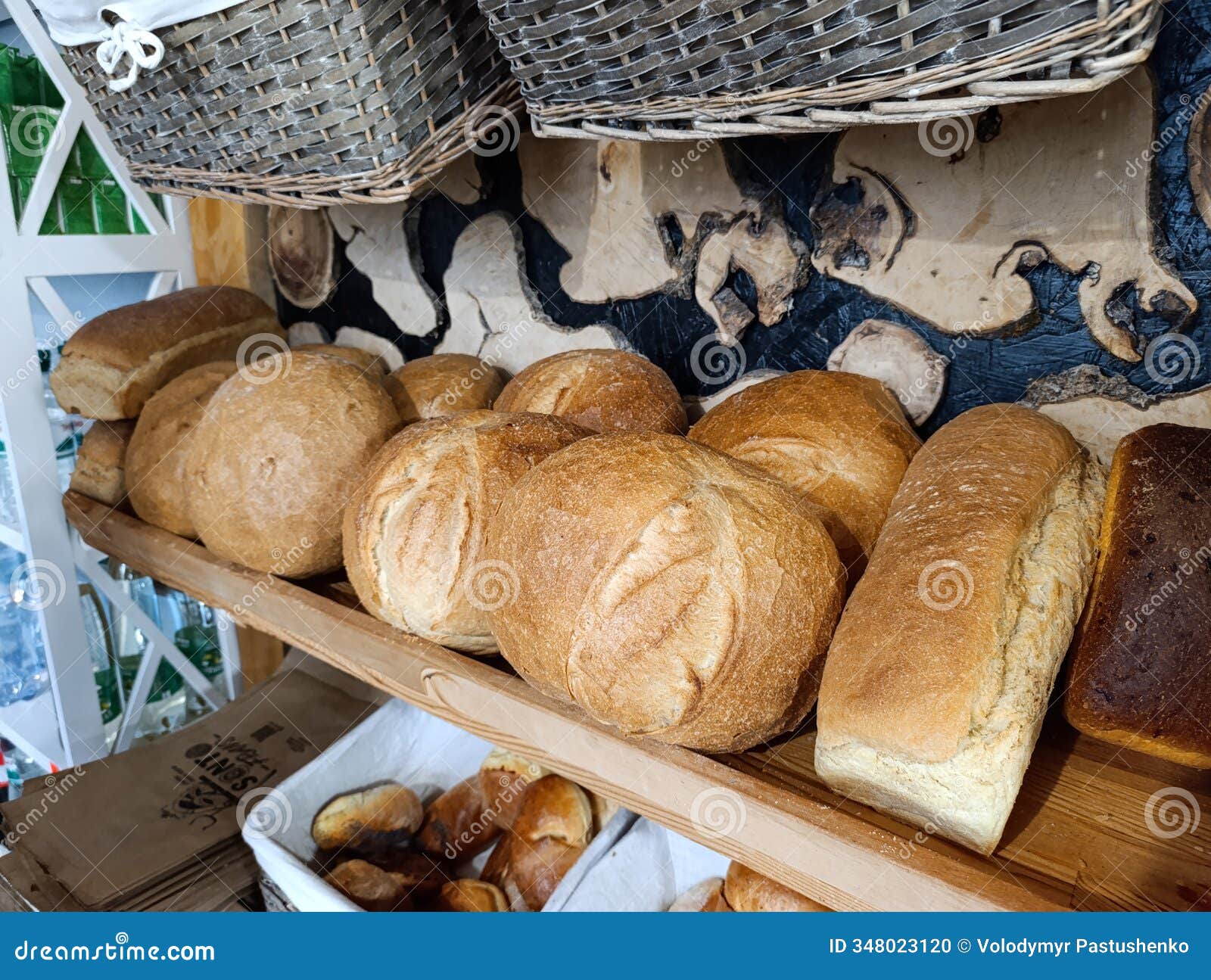 A Shelf Filled with Lots of Different Types of Bread Stock Photo ...