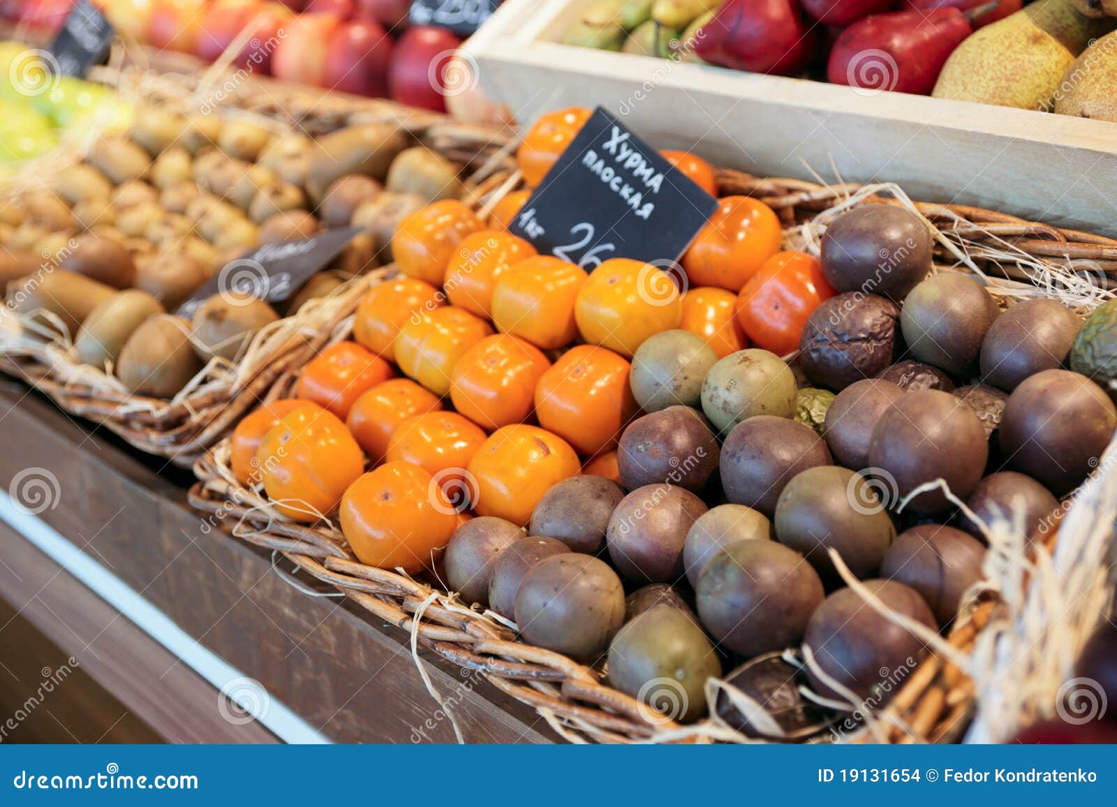 Shelf with fruits stock photo. Image of persimmon, long - 19131654