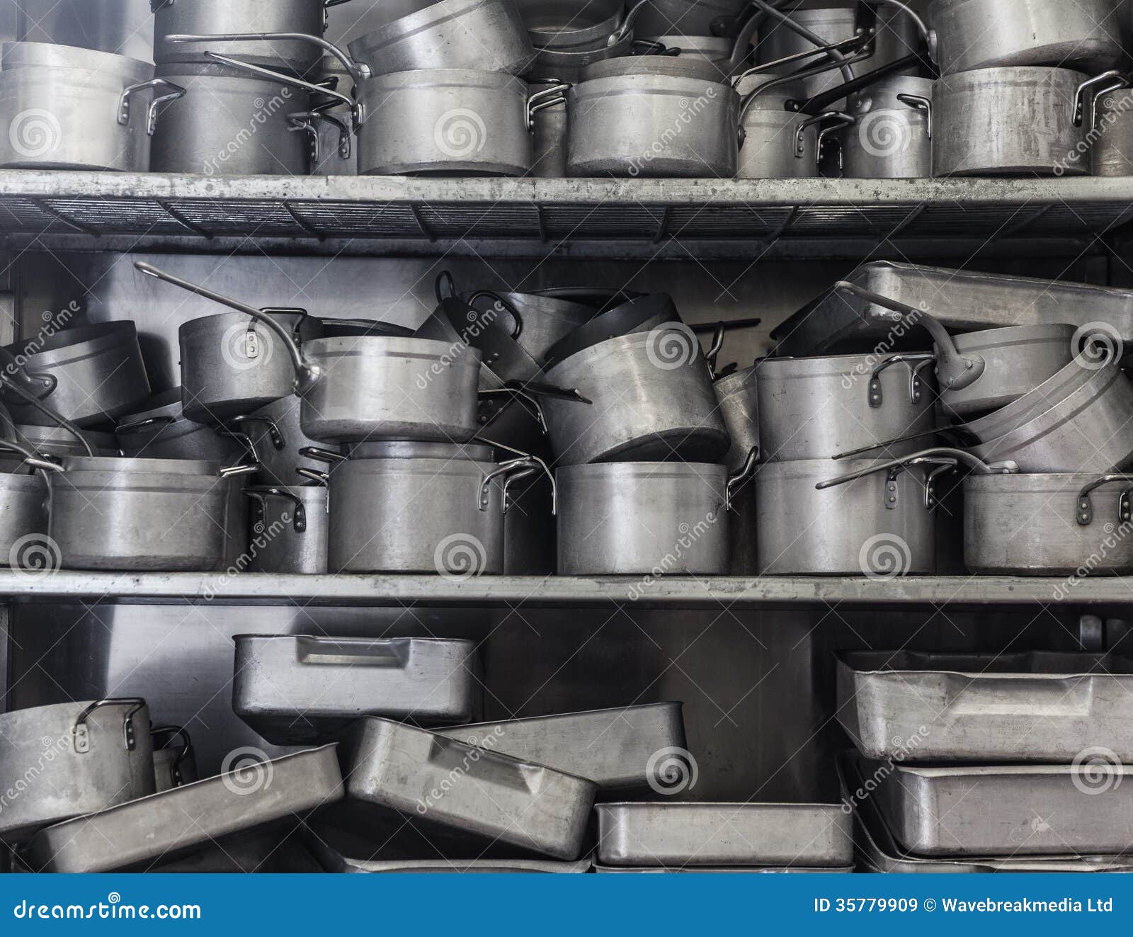 Shelf full of pans stock image. Image of professional - 35779909