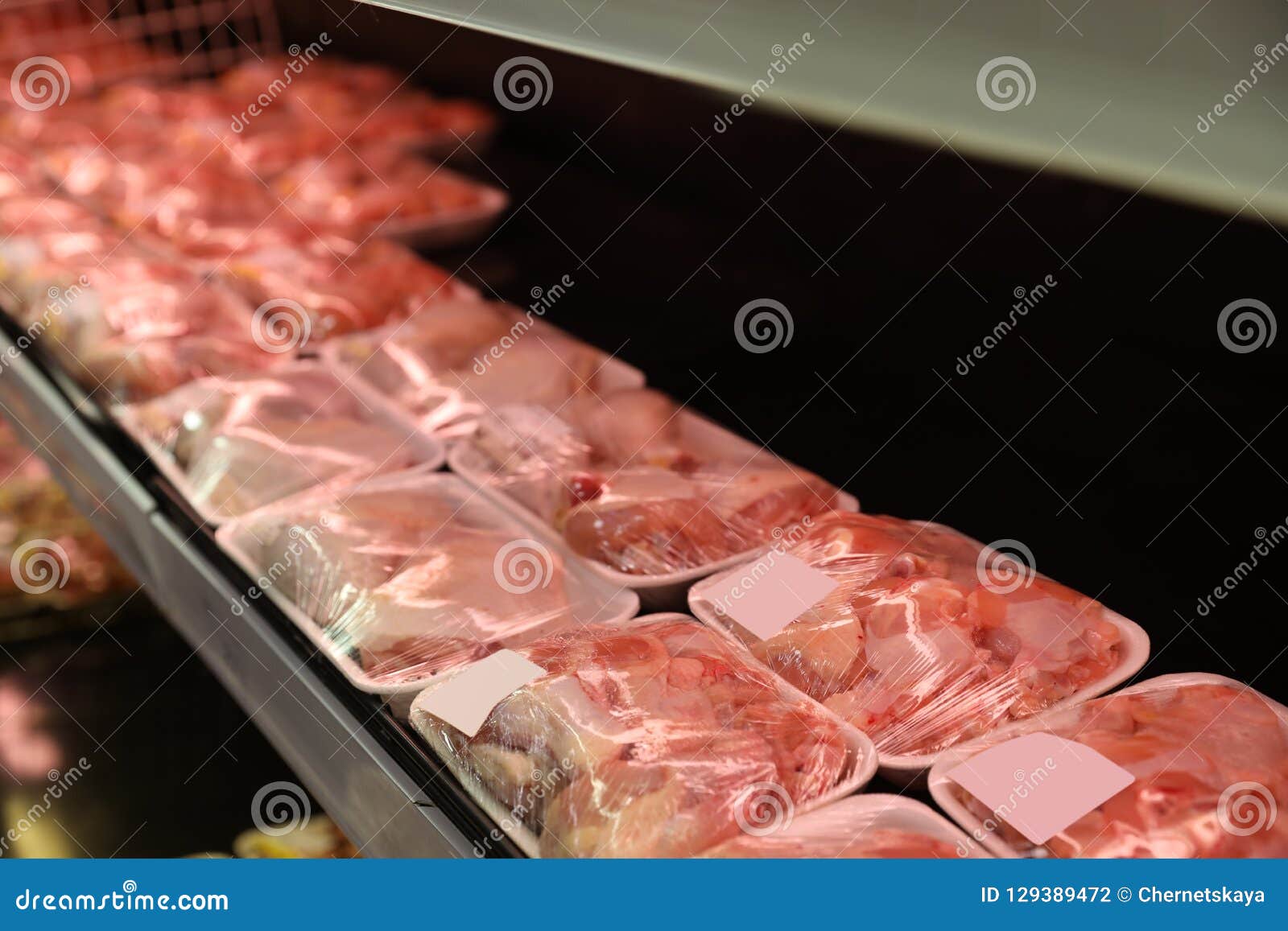 Shelf with Packed Chicken Meat Stock Photo - Image of chicken, selling ...